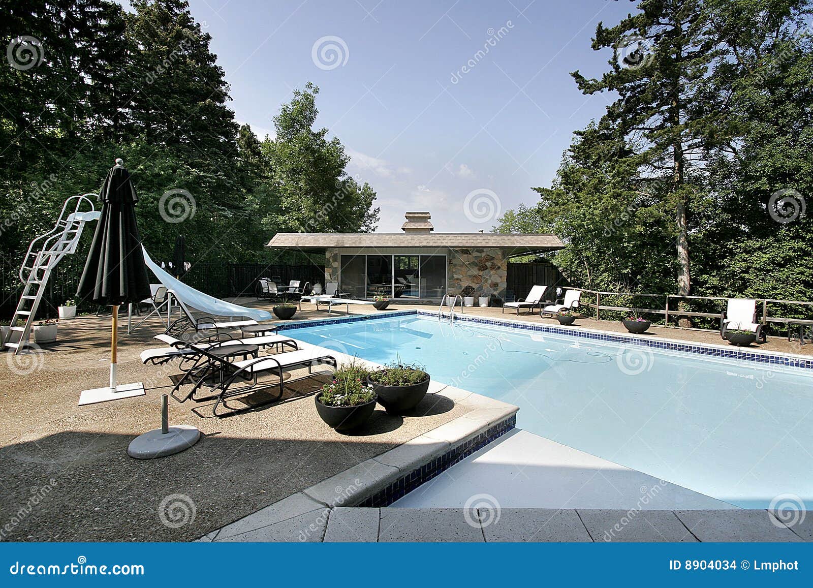 Pool slide and pool house stock photo. Image of single - 8904034