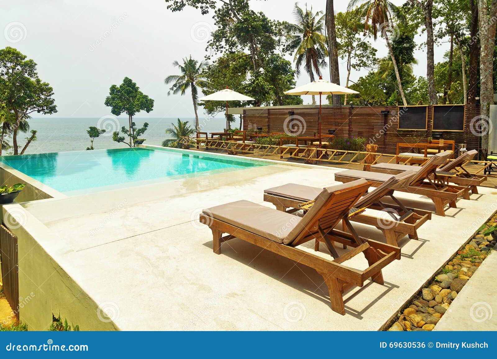 Pool in small resort stock photo. Image of color, hotel - 69630536