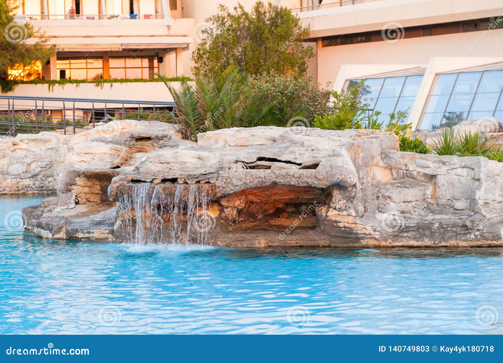 A Pool of Stone Pours Water Out of it Stock Image - Image of garden ...