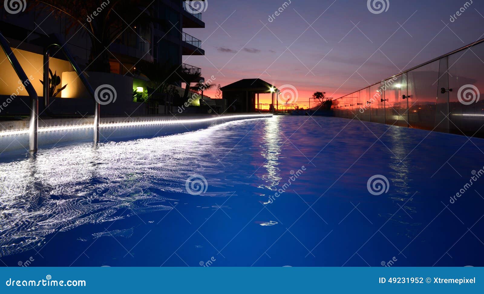A pool at sunset stock photo. Image of swim, waters, pool - 49231952