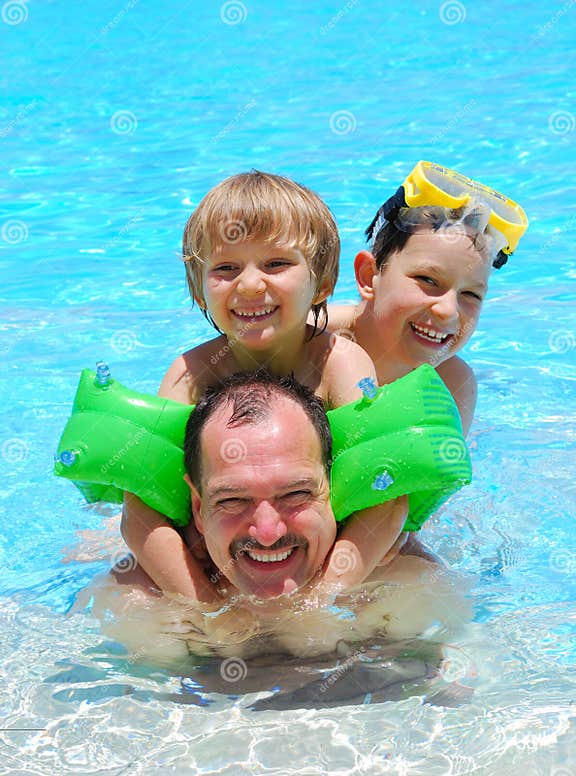 Pool time fun stock photo. Image of youthful, young, joyful - 2604934