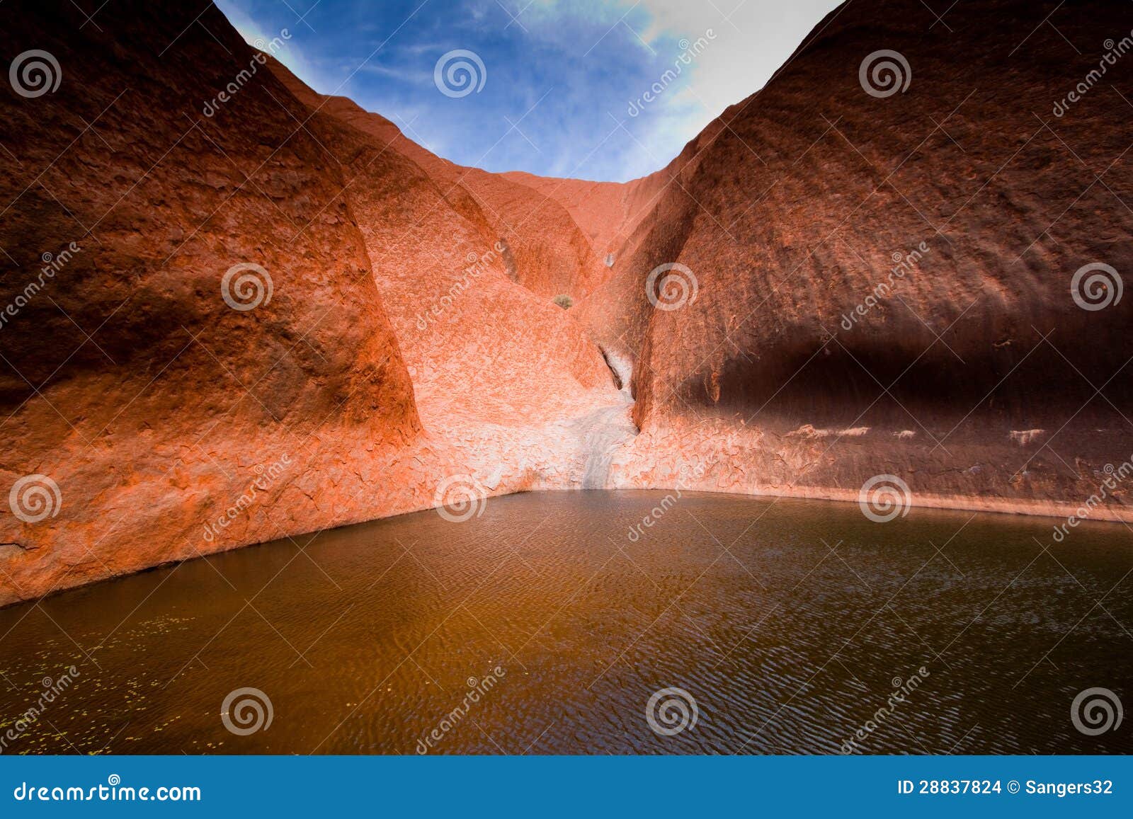 Pool under Uluru editorial stock image. Image of background - 28837824