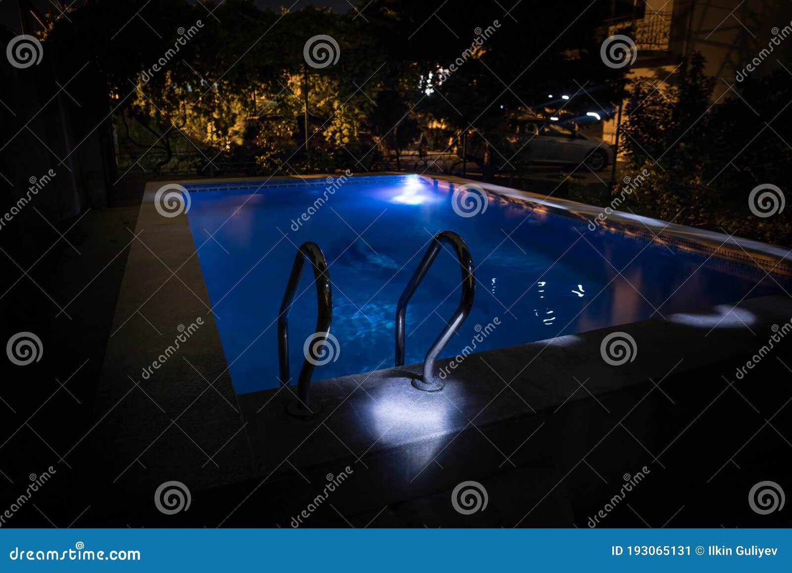 Pool and Waterfall at Night - Vacation Background. Colorful Light ...