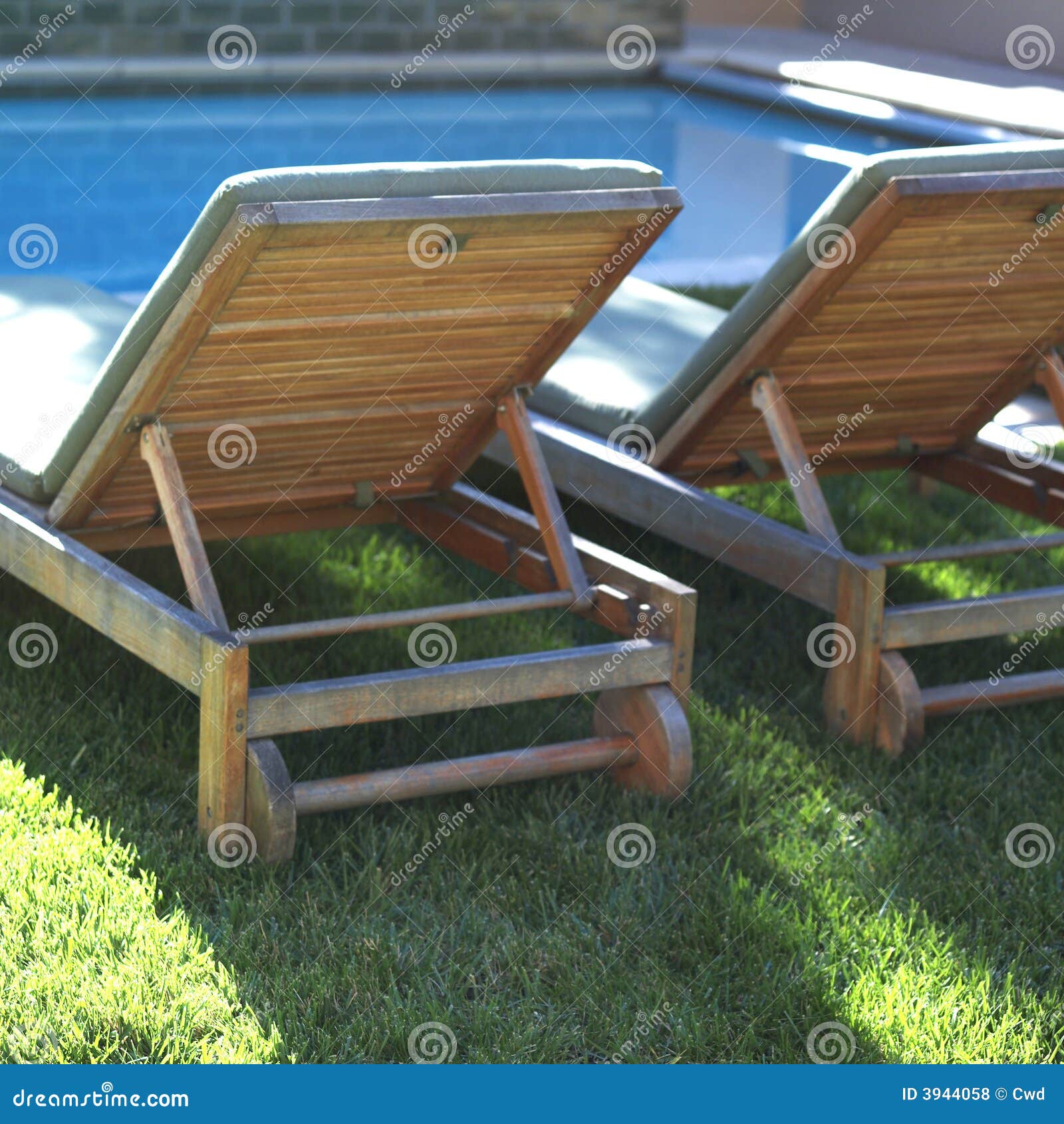 Poolside chairs stock photo. Image of lawn, outdoors, pool - 3944058