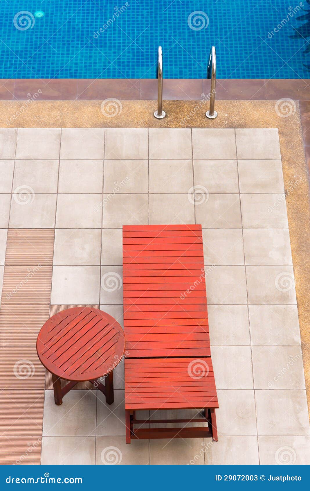 Poolside Deckchairs Alongside Blue Swimming Pool from Top View Stock ...