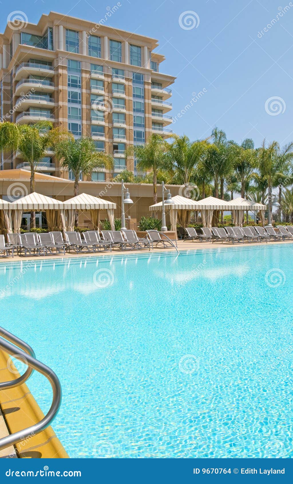Poolside at Modern Condos stock photo. Image of trees - 9670764
