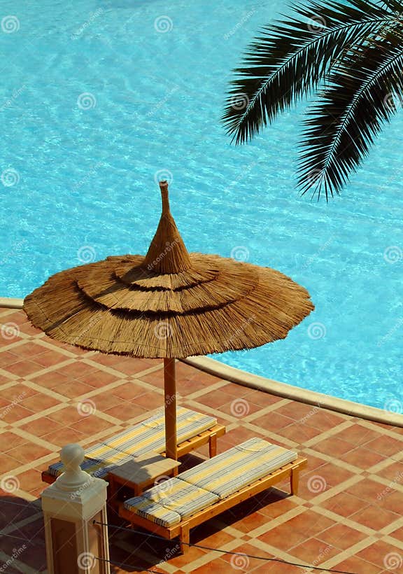Poolside relaxation stock photo. Image of poolside, beauty - 7216970