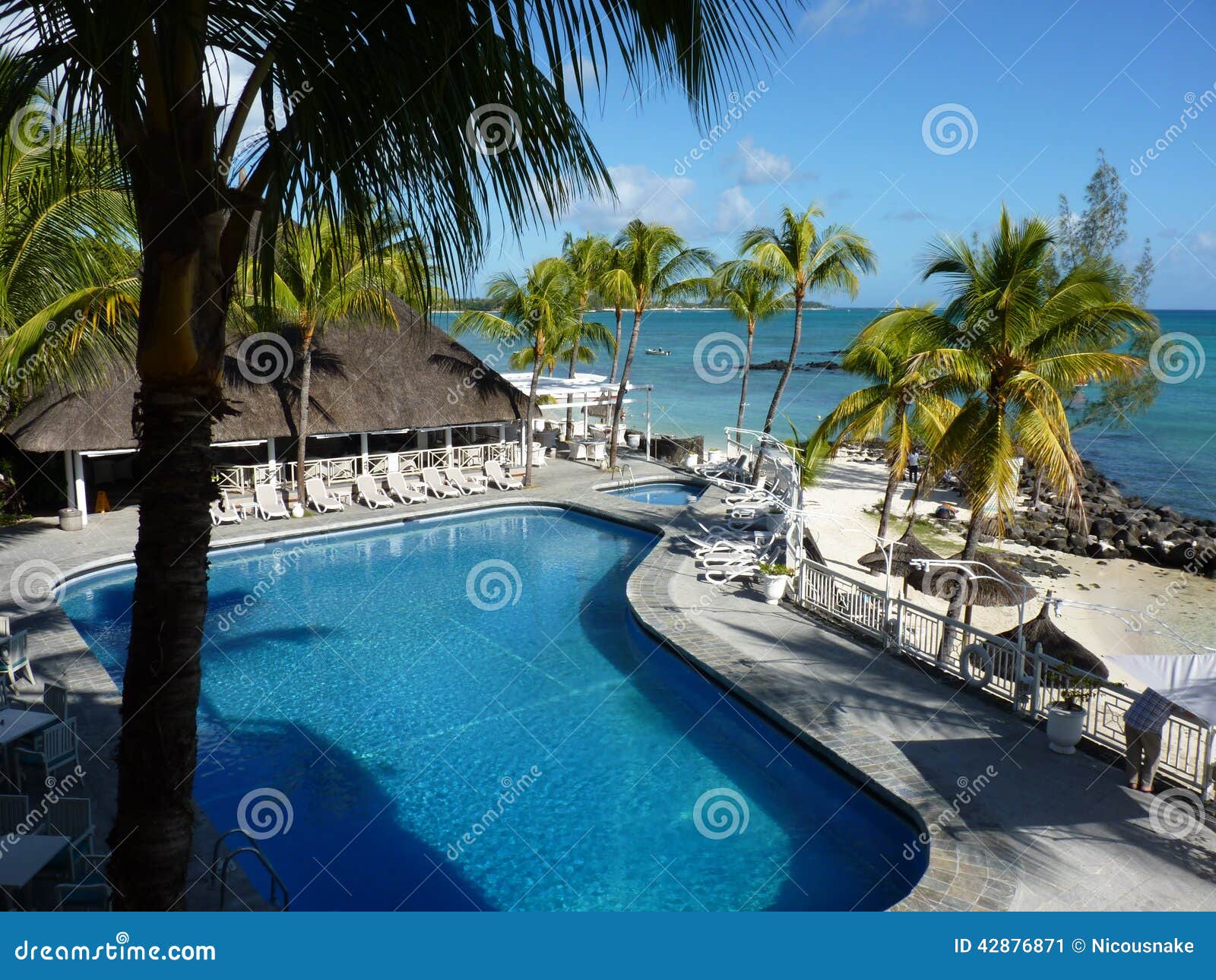 Poolside View of Luxury Hotel Stock Image - Image of ocean, modern ...