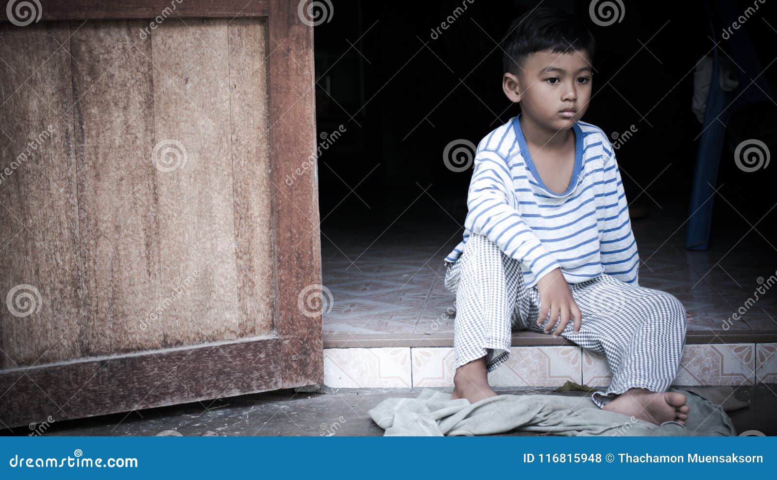 Poor asian boy sad alone stock photo. Image of cute - 116815948