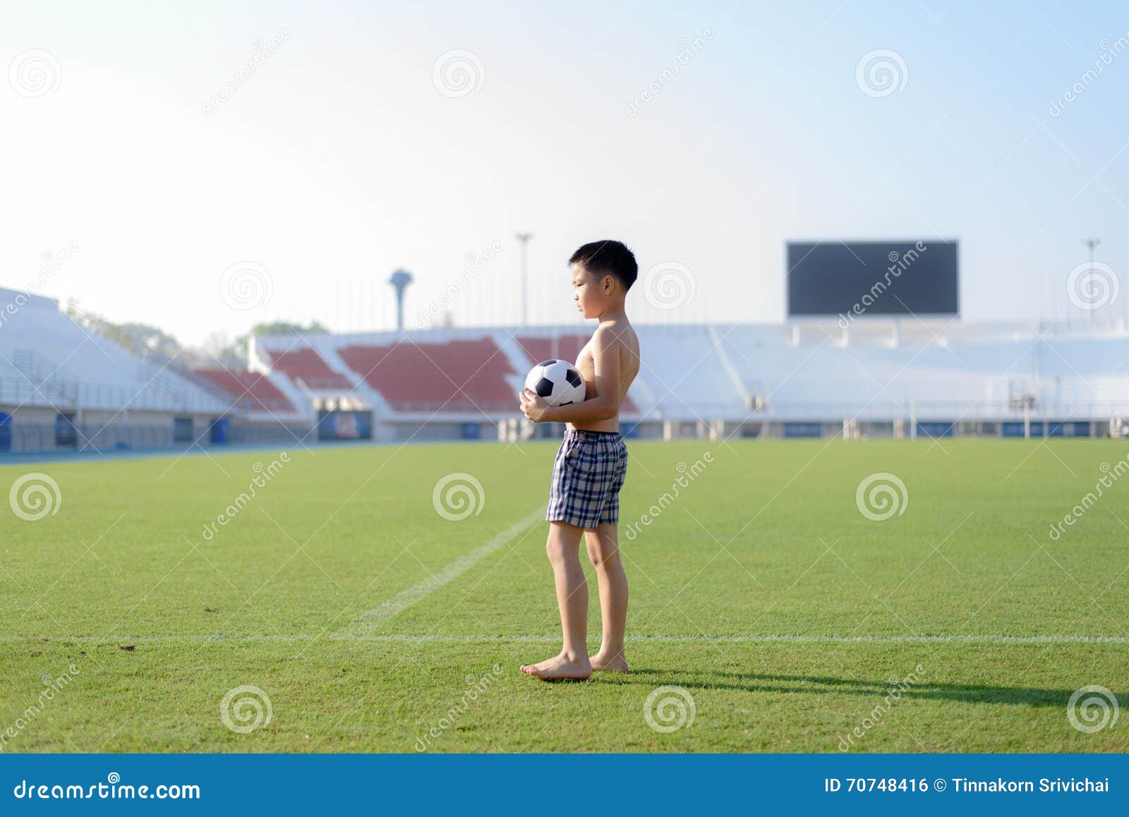 Poor Boy on the Football Field Stock Photo - Image of happy, children ...