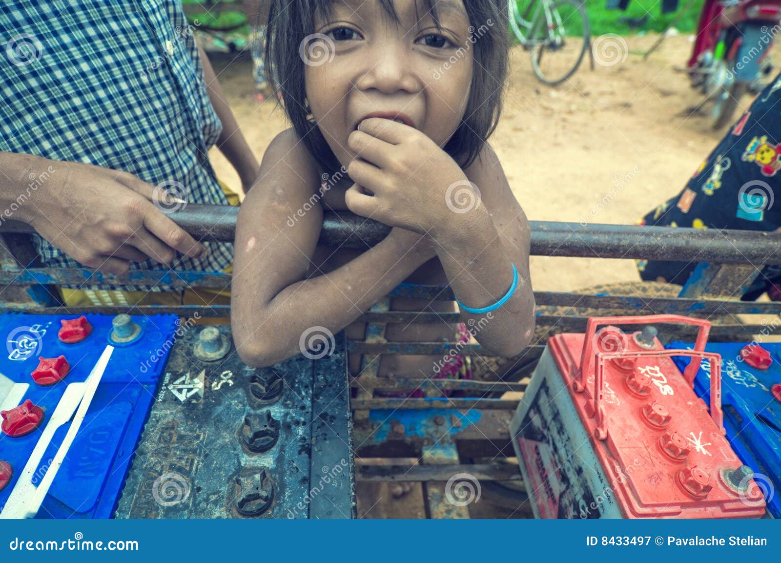 Poor cambodian kid playing editorial photography. Image of bent - 8433497