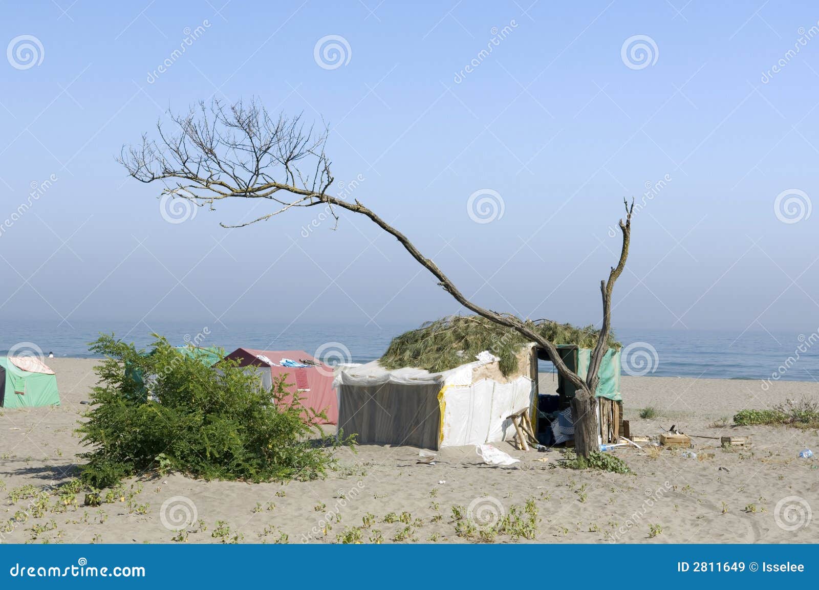 Poor camp on the beach stock image. Image of cloth, water - 2811649