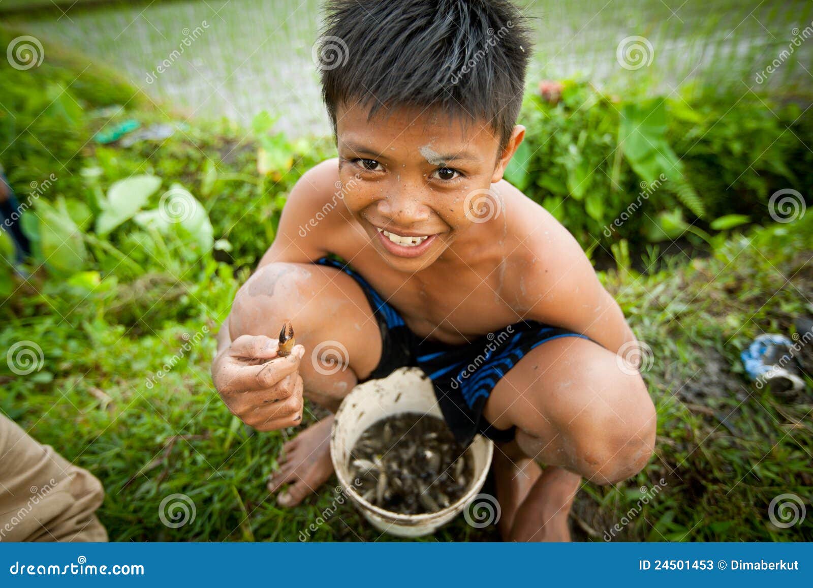 Poor Child Catches Small Fish in a Ditch Editorial Stock Photo - Image ...