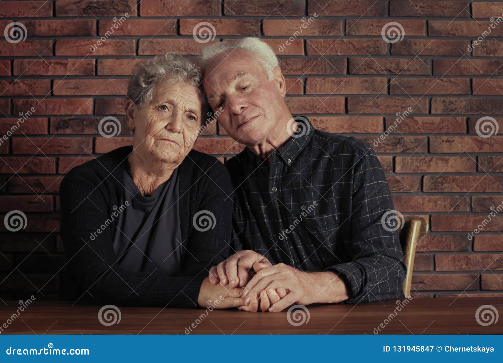 Poor Elderly Couple Sitting and Holding Hands Stock Image - Image of ...