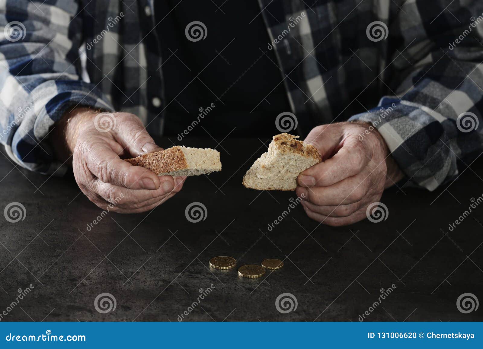 Poor Elderly Man with Bread at Table, Focus Stock Photo - Image of ...