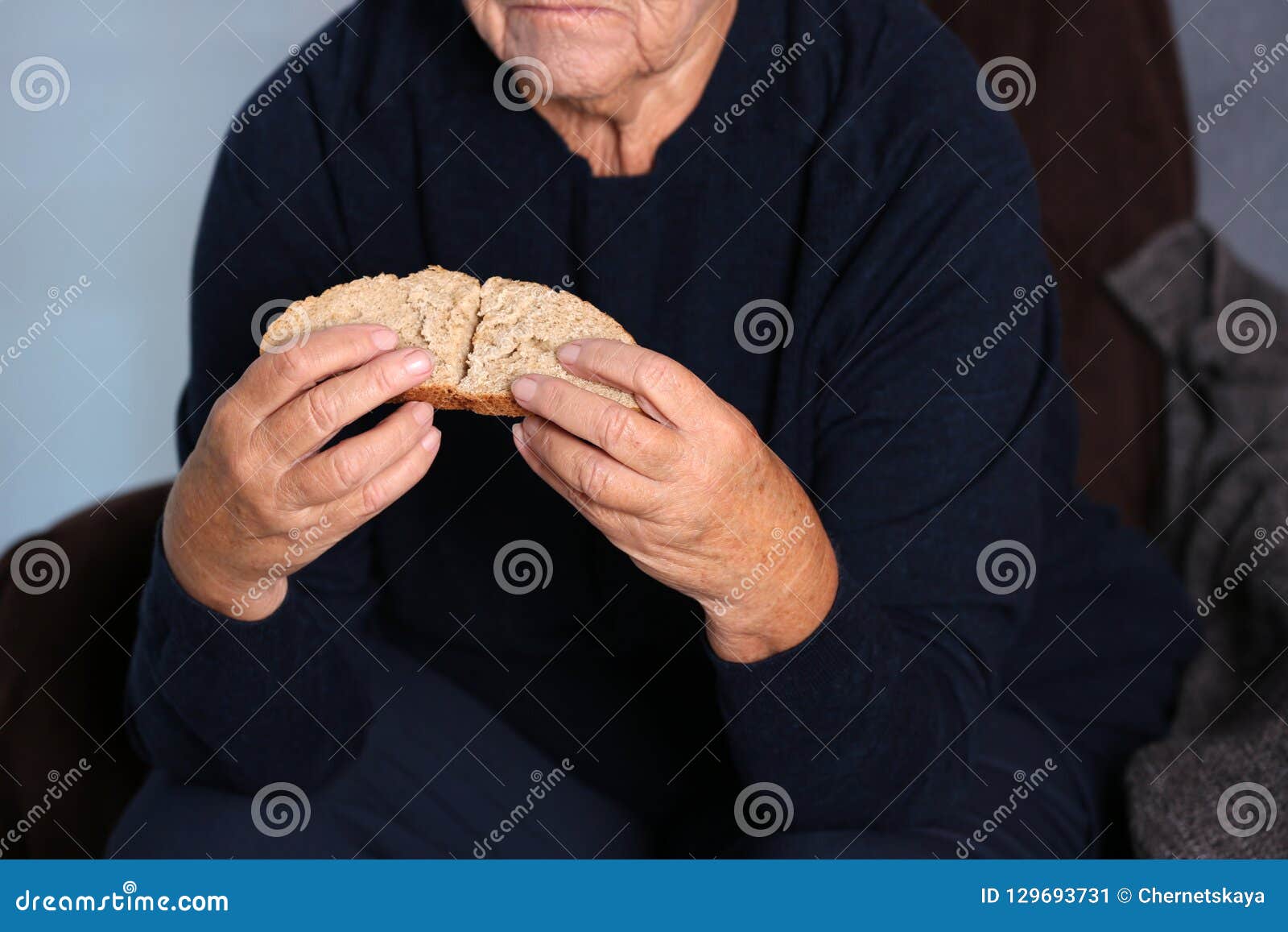 Poor Elderly Woman Holding Bread Stock Image - Image of hunger ...