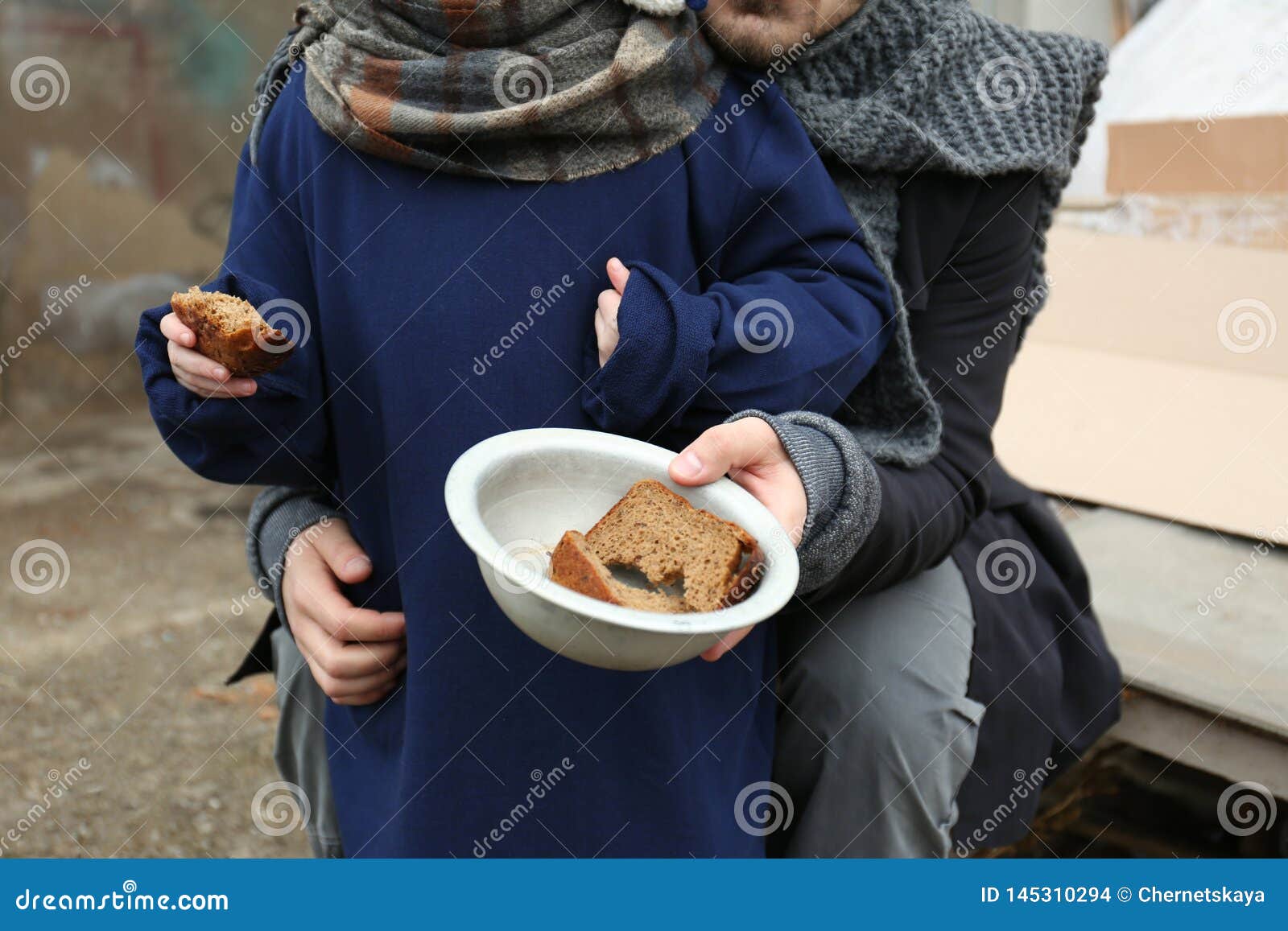 Poor Father and Child with Bread at Dump Stock Photo - Image of hands ...