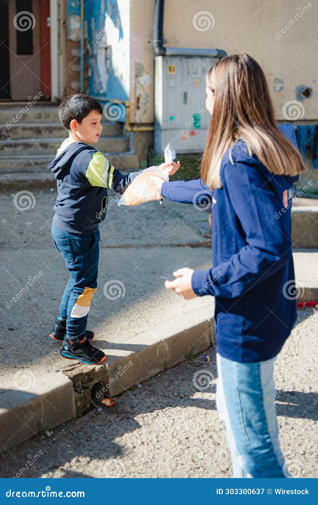 Poor Gypsy Looks For Something To Eat Inside The Garbage Bin Royalty ...