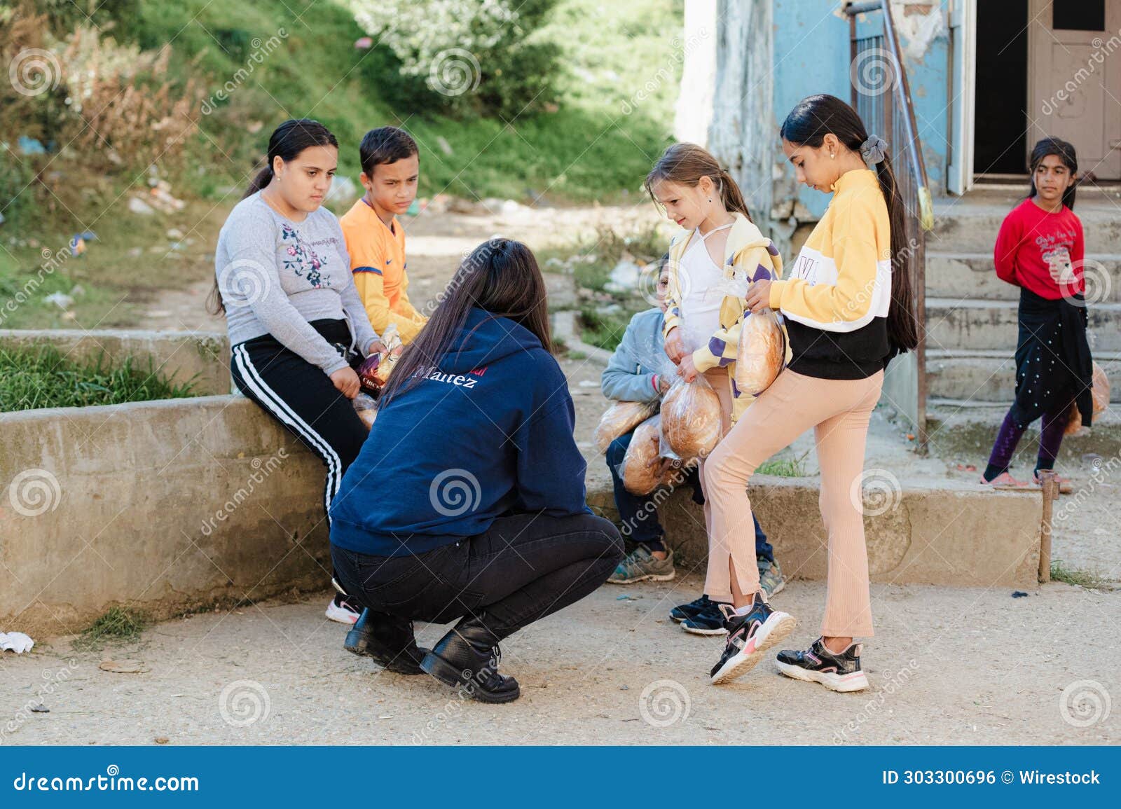 Poor Gypsy Kids Getting Bread from Volunteers Editorial Photo - Image ...