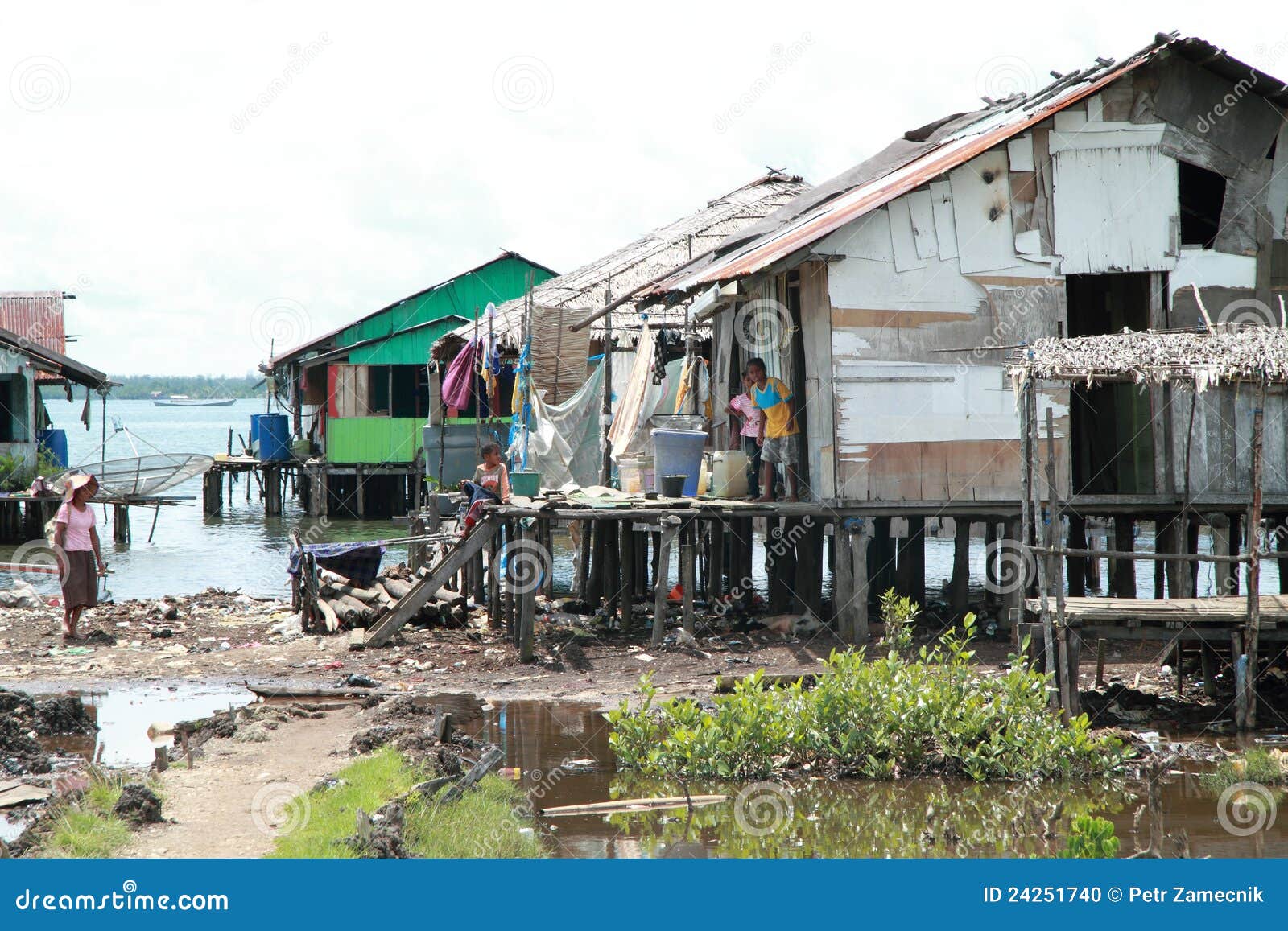 Poor houses by the sea editorial image. Image of indonesia - 24251740