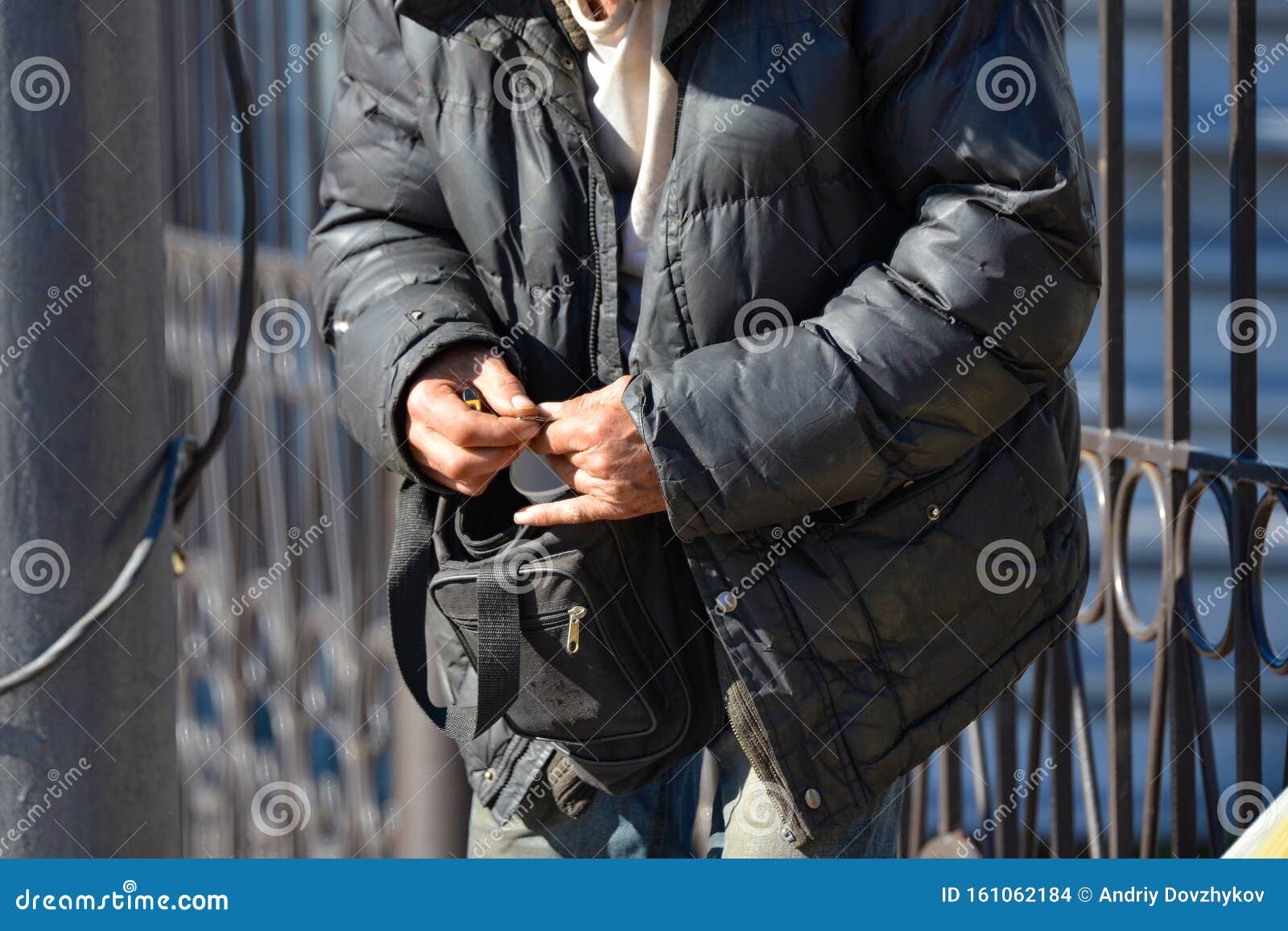 A Poor and Impoverished Person Asks for Alms Stock Photo - Image of ...