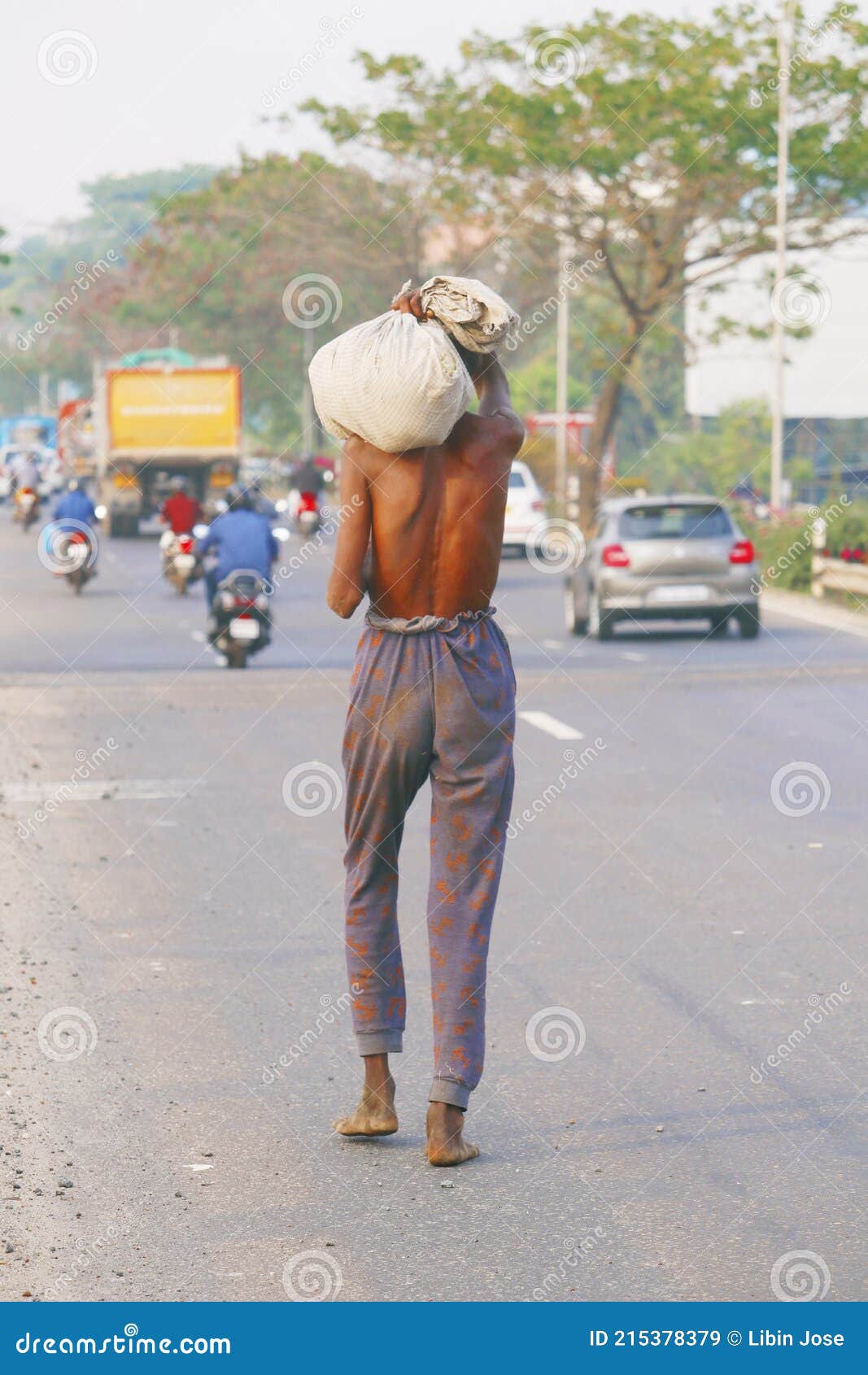 Poor Indian Man Walking with Bare Foot on a Street Stock Image - Image ...