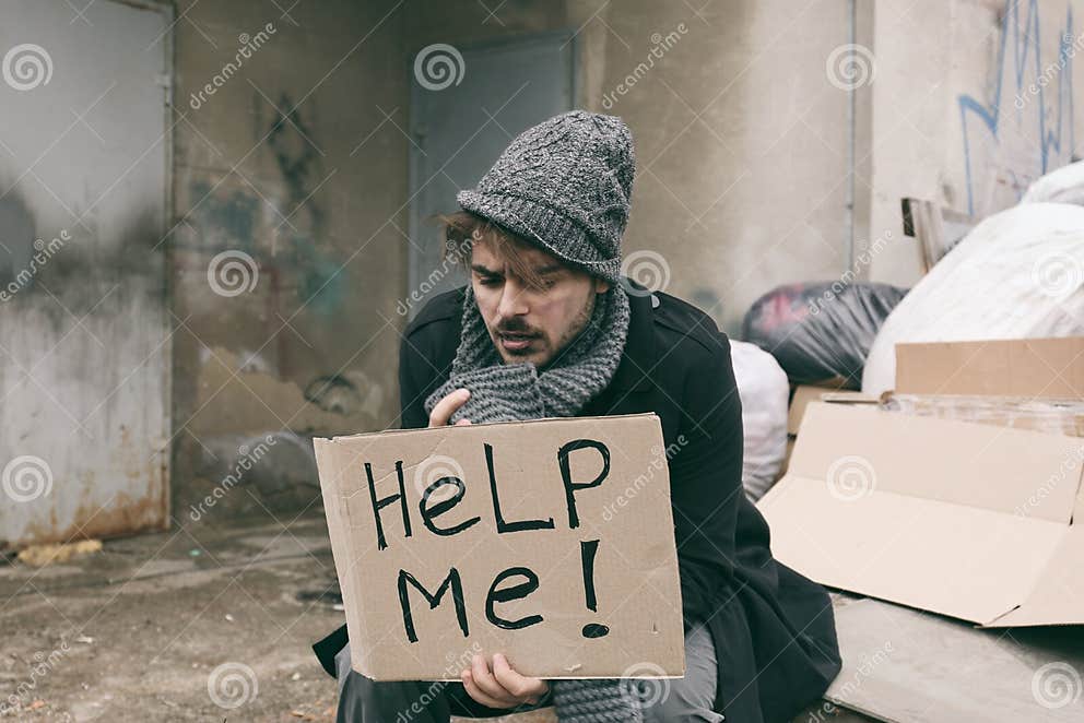 Poor Man with HELP ME Sign at Dump Stock Image - Image of lonely, needy ...
