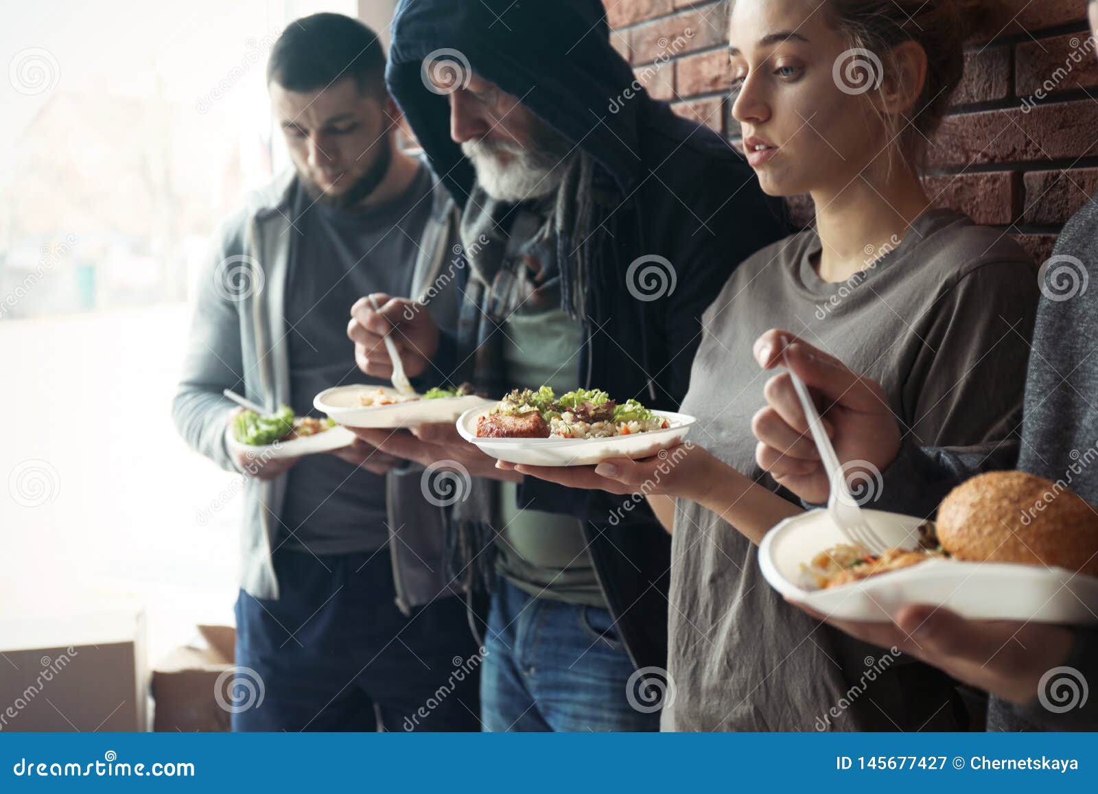 Poor People with Plates of Food at Wall Stock Image - Image of donation ...