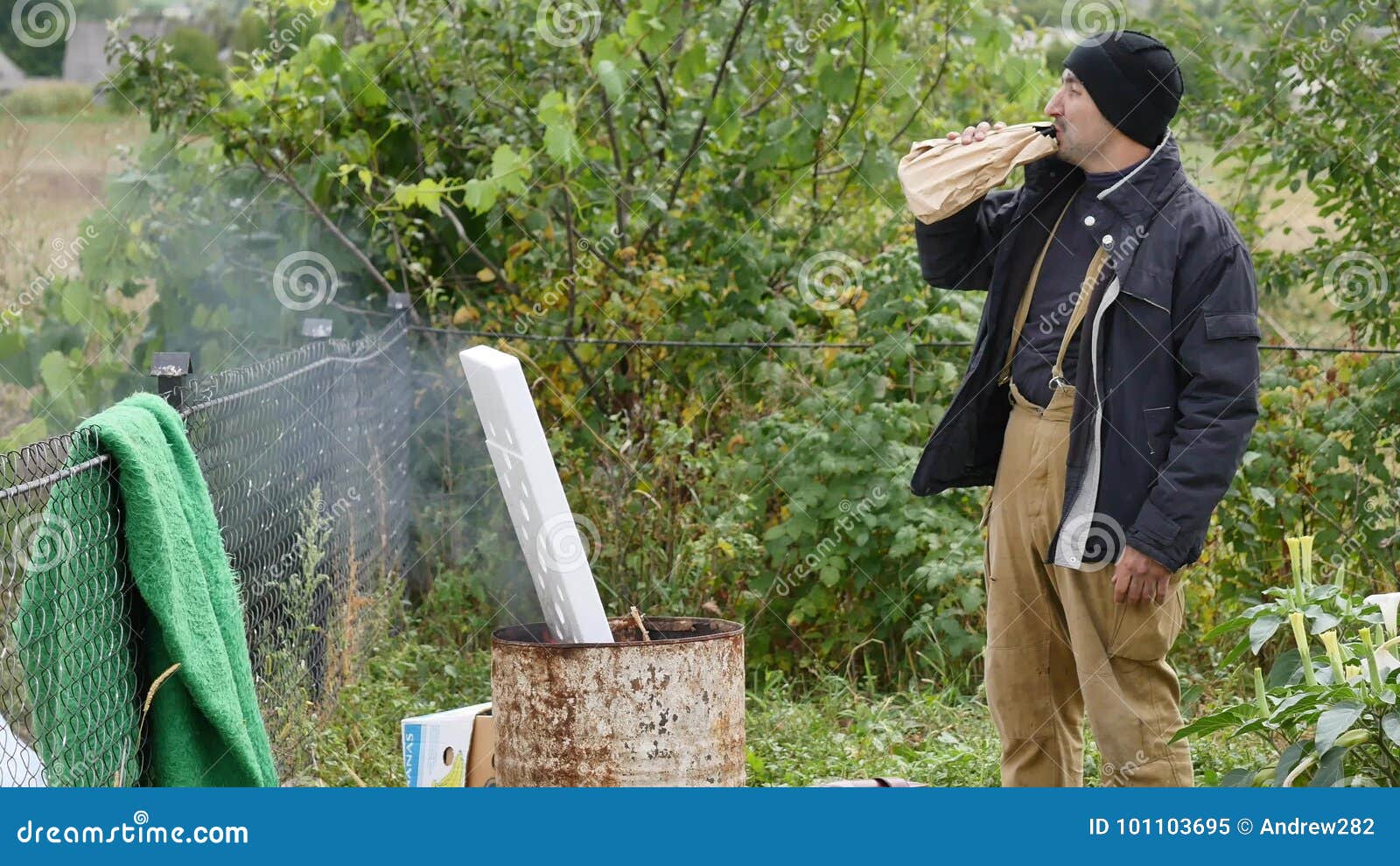 Poor People Warming Near Fire Trash Barrel and Drink Vodka Stock Image ...