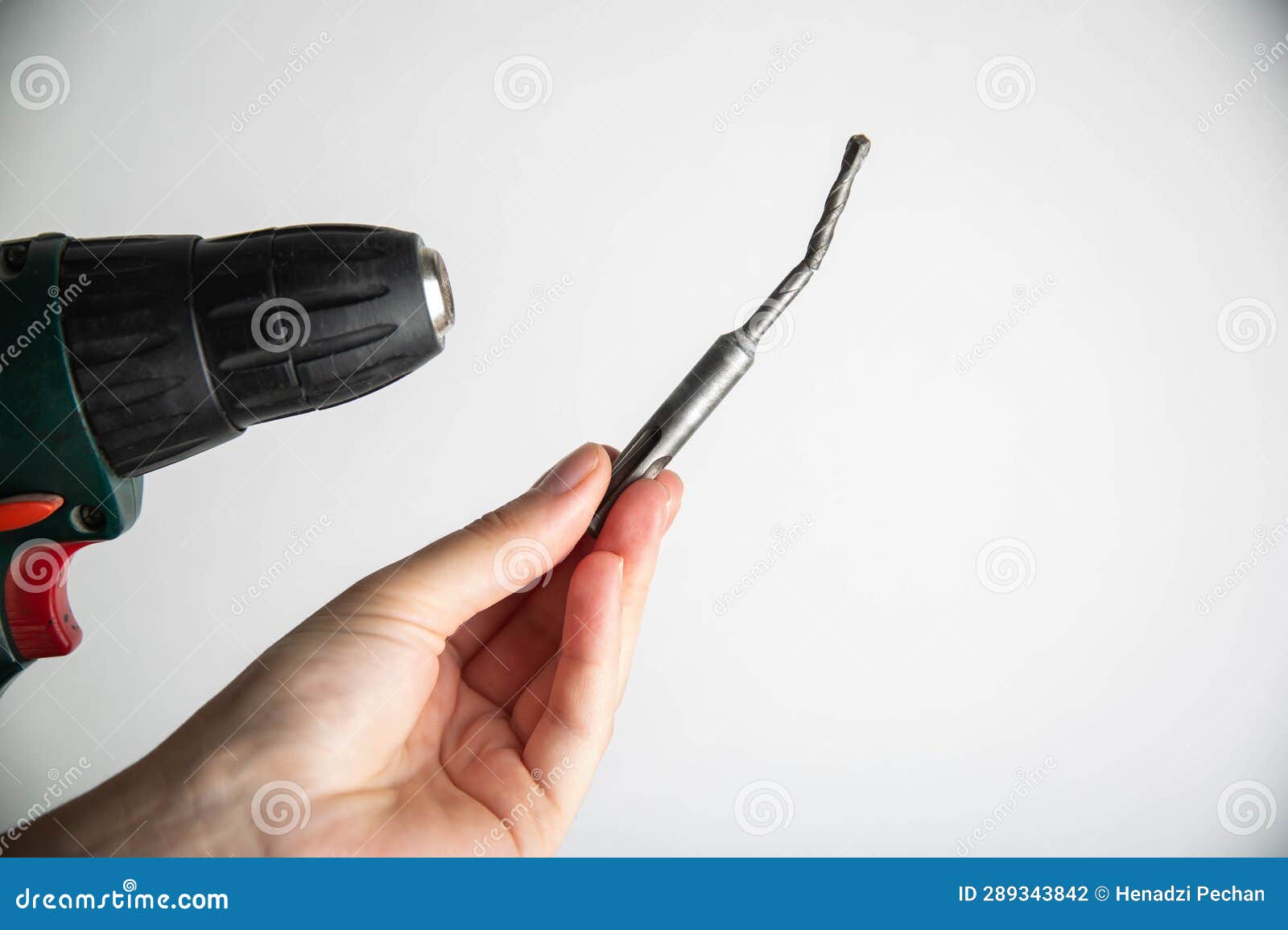 Poor Quality Broken Metal Drill on a White Background, Close-up Stock ...