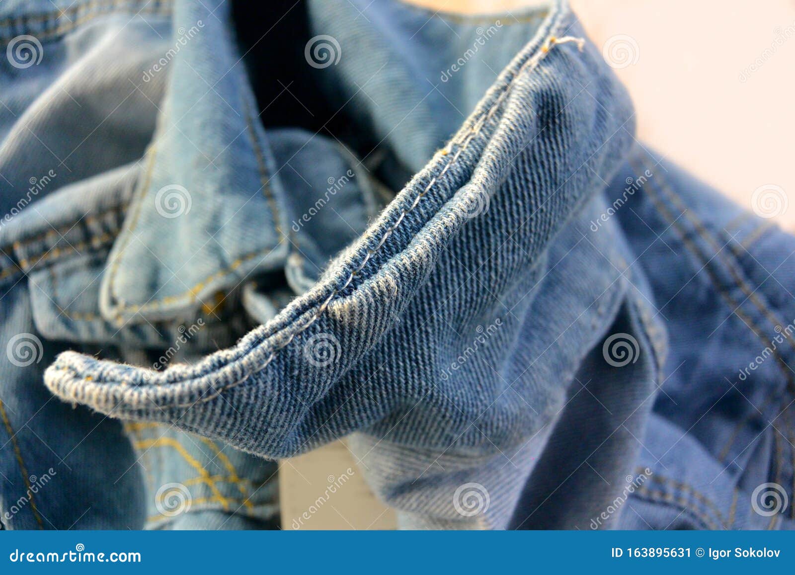 Poor Seam Quality on a Denim Jacket. Bad Work Stock Image - Image of ...