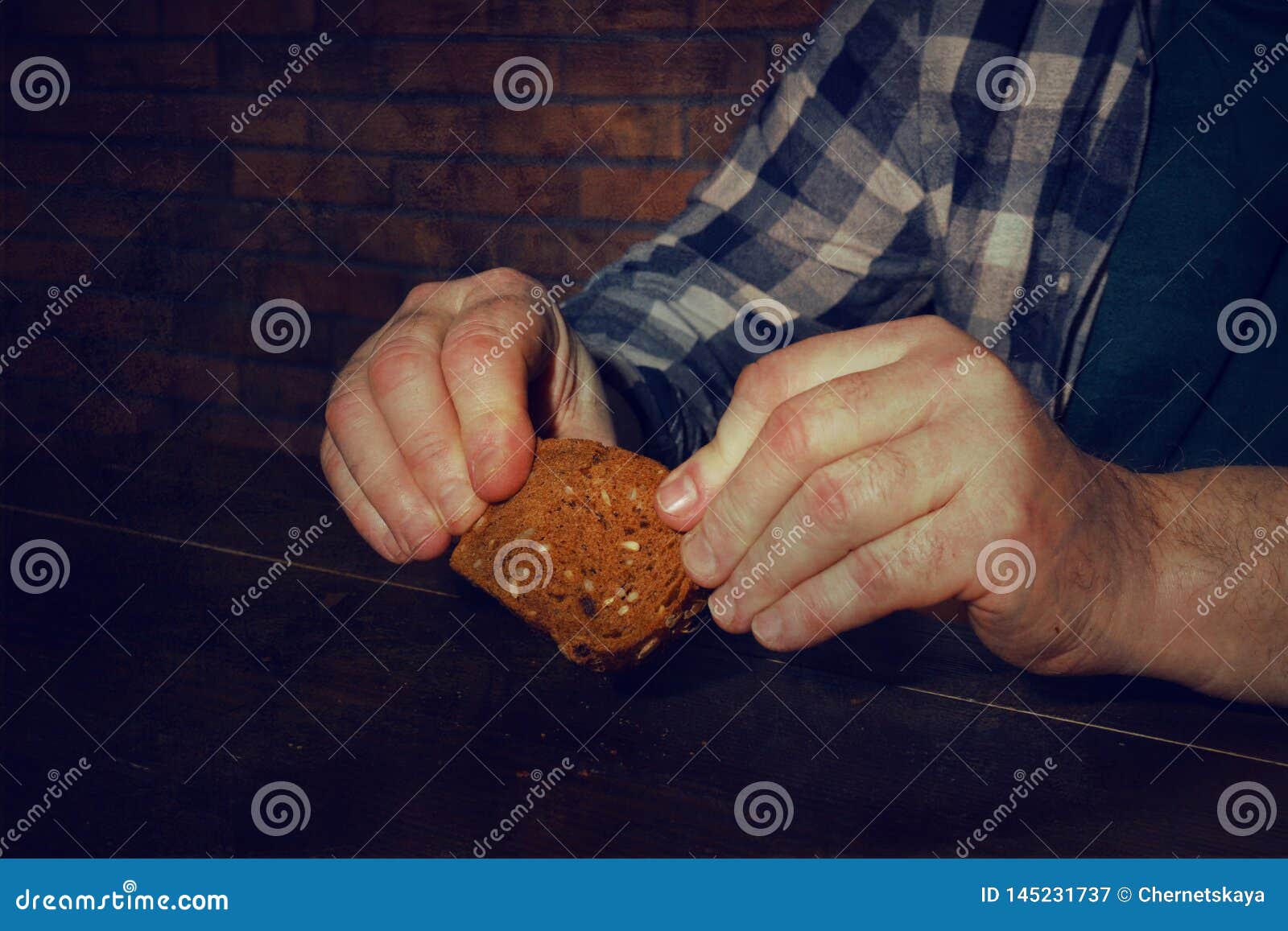 Poor Senior Man with Bread at Table, Stock Image - Image of middleaged ...