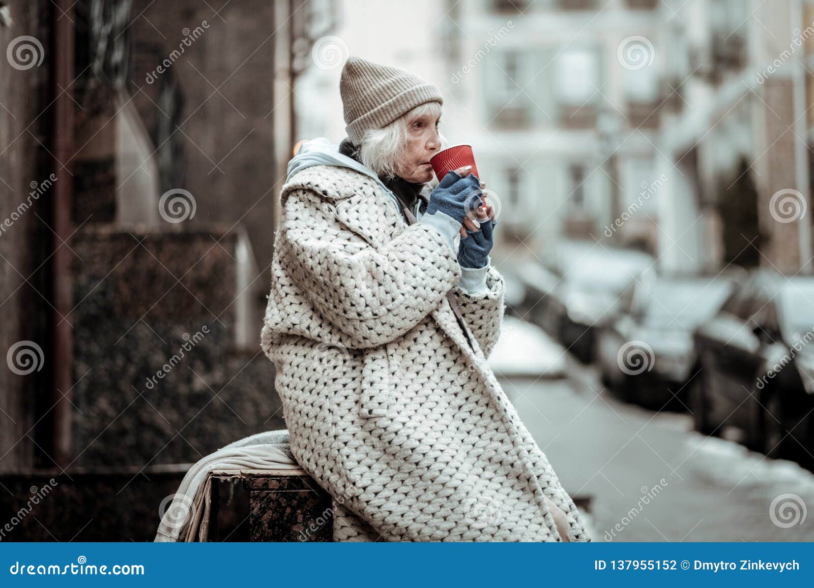 Poor Senior Woman Drinking Tea on the Street Stock Photo - Image of ...