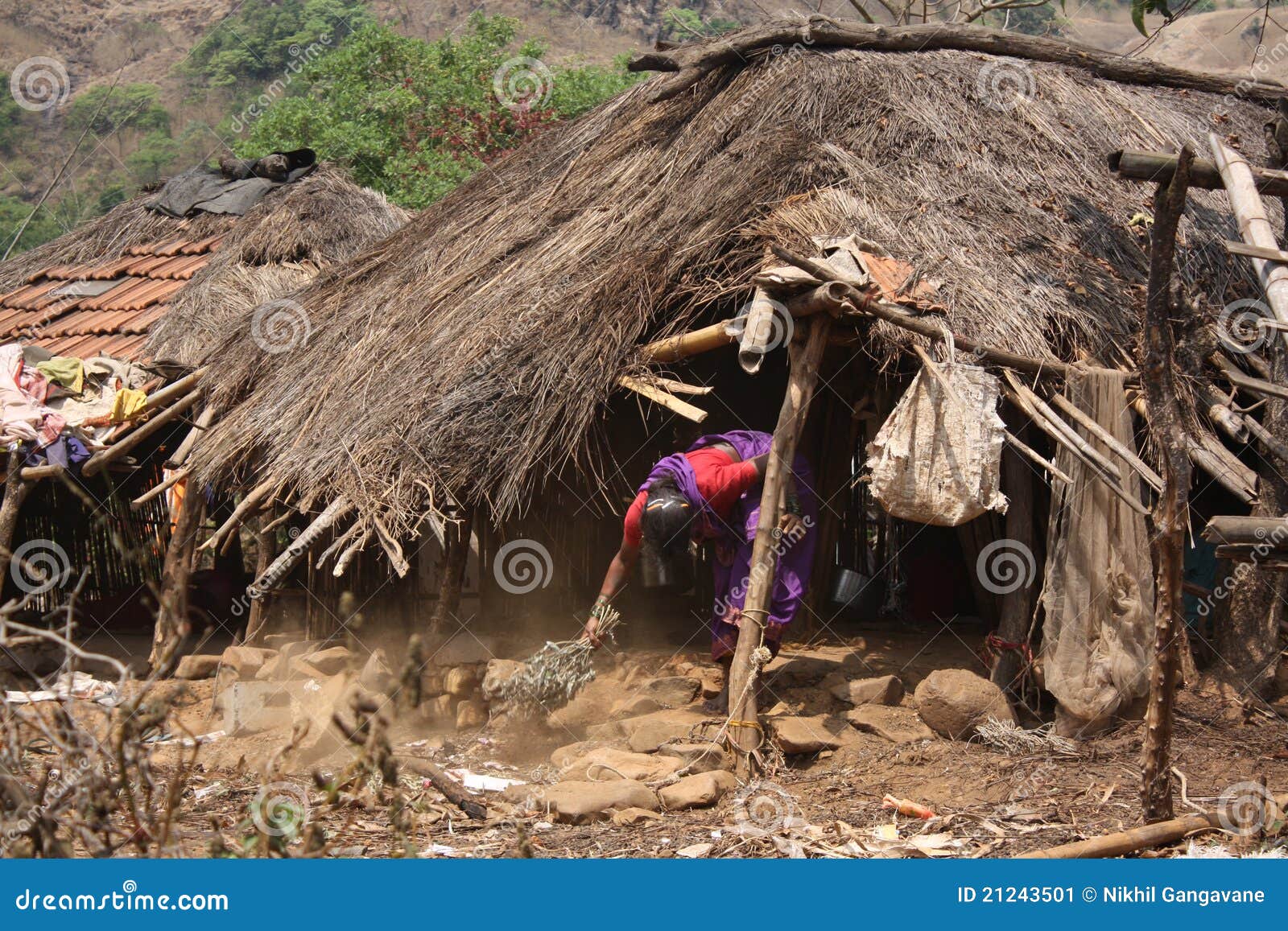 Poor Woman Cleaning Hut editorial photo. Image of female - 21243501
