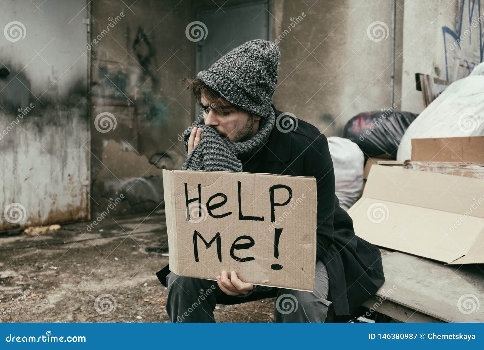 Poor Young Man with HELP ME Sign Stock Image - Image of hunger, beggar ...