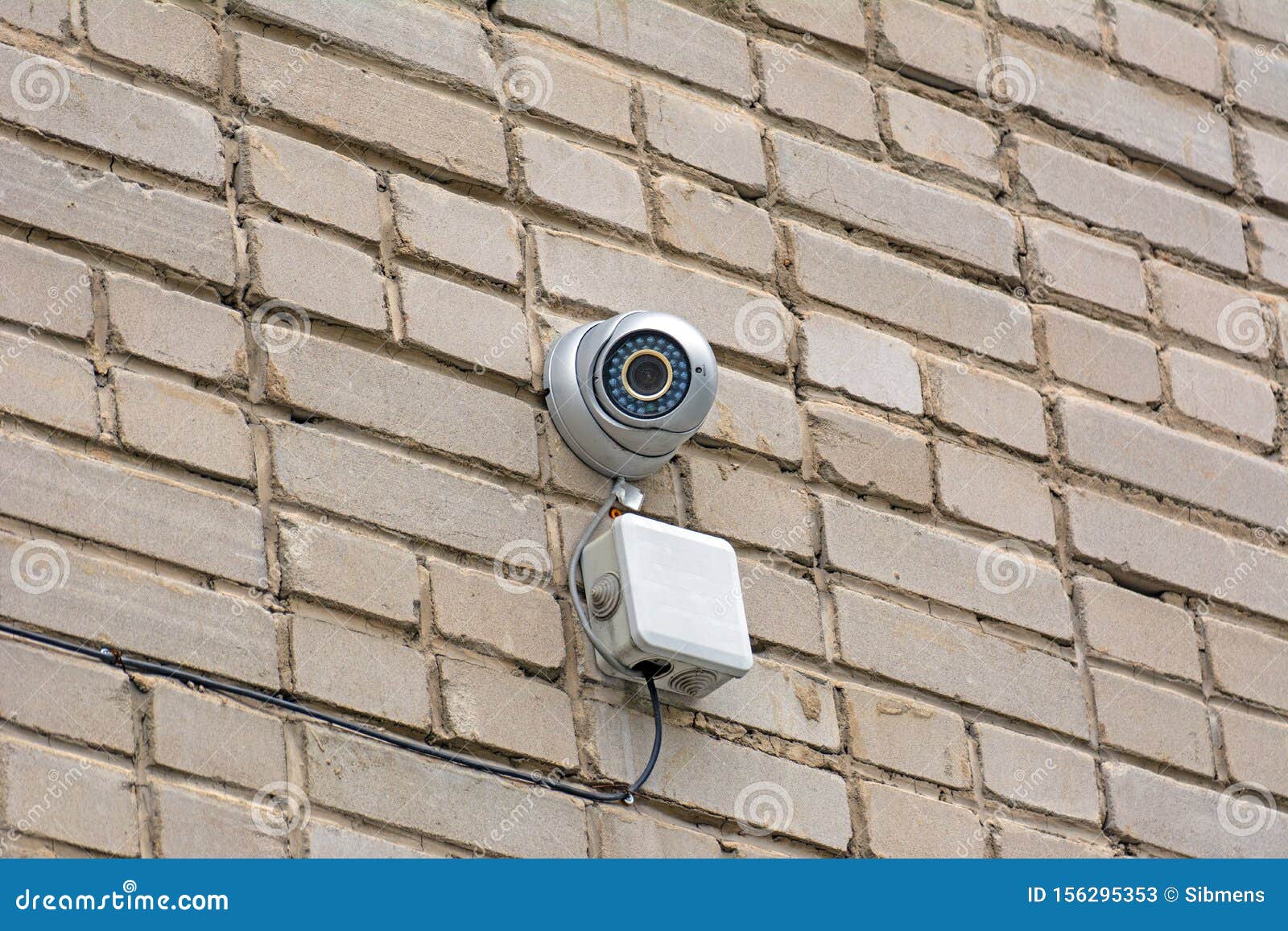 Poorly Installed Outdoor Surveillance Camera Mounted on the Wall of the ...