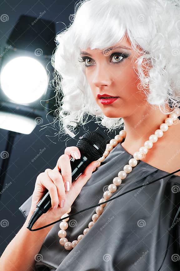 Pop star singing the song stock image. Image of audio - 17980341