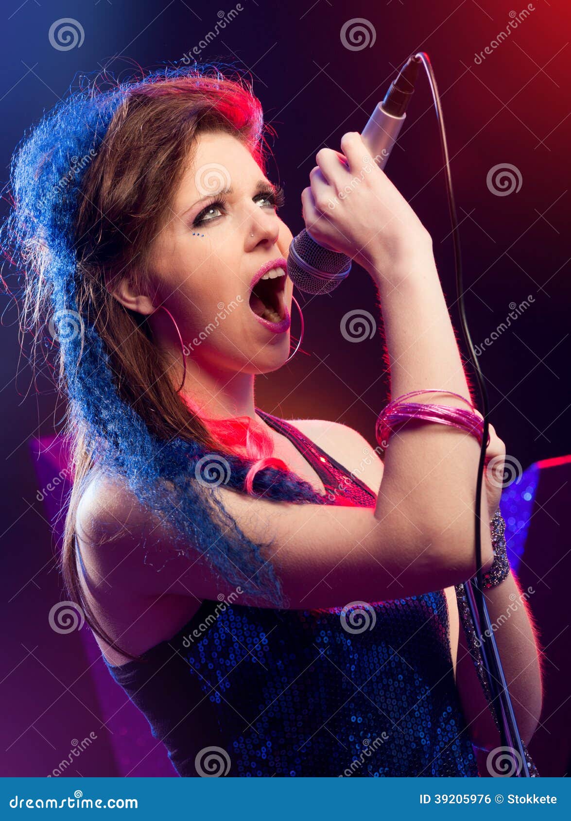 Pop star singing on stage stock photo. Image of popular - 39205976