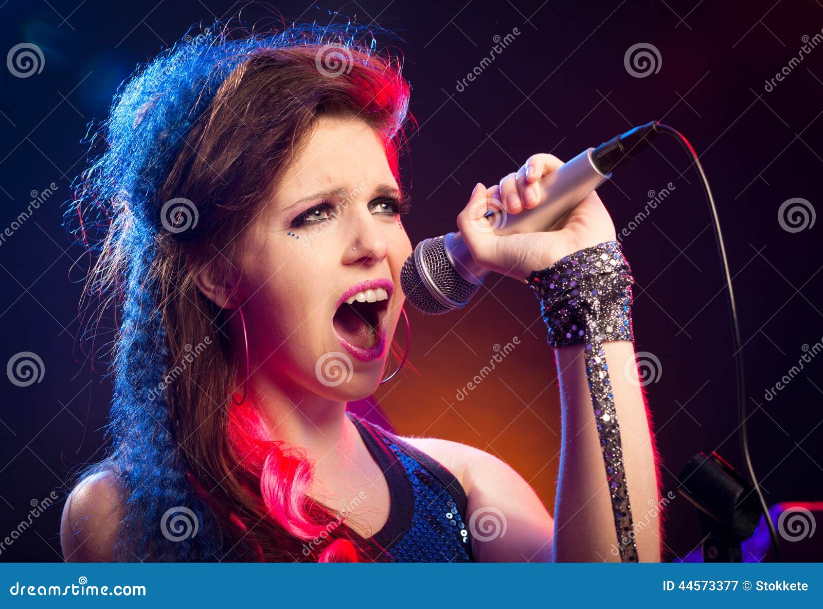 Pop star singing on stage stock image. Image of young - 44573377