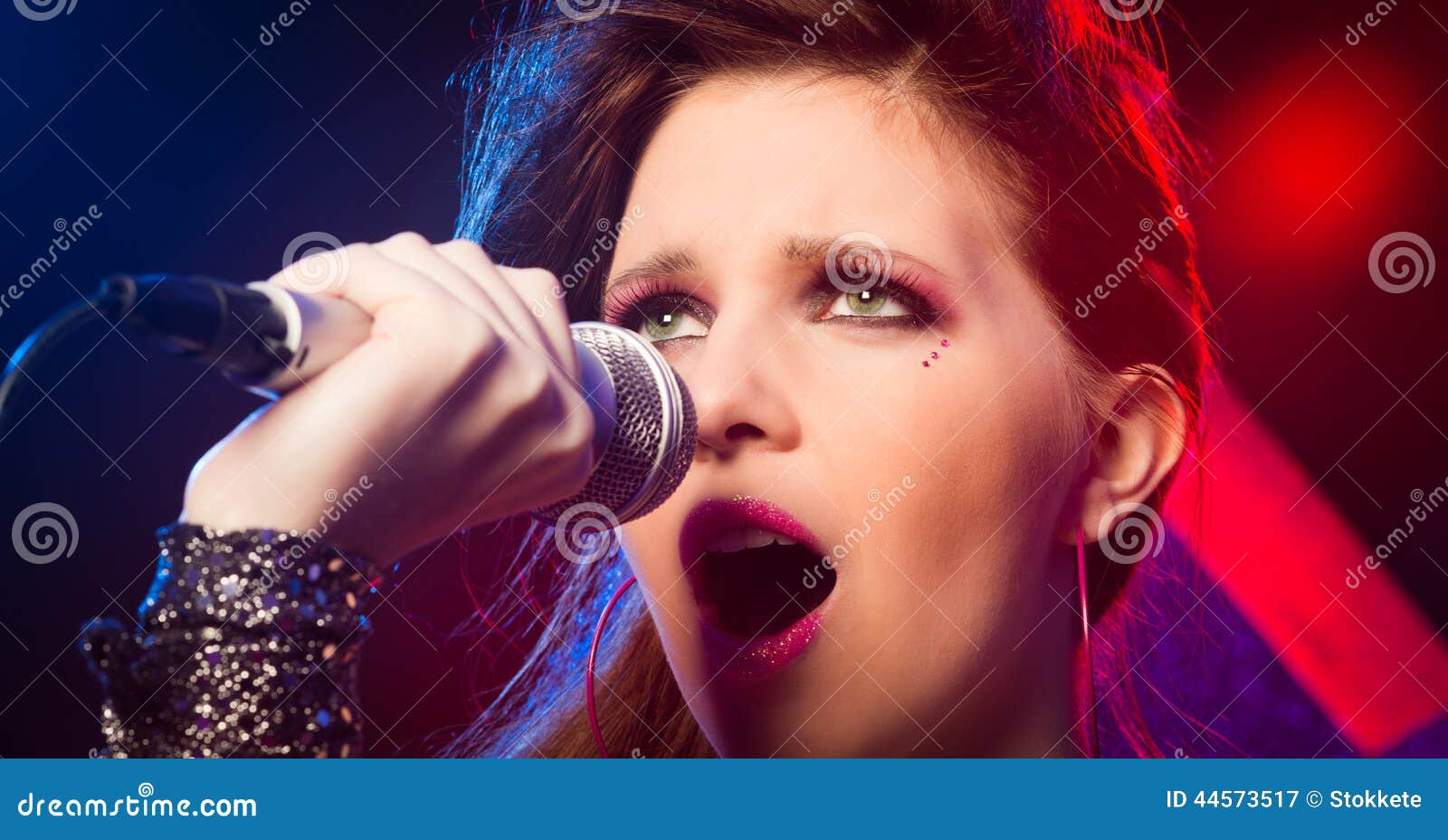 Pop star singing on stage stock image. Image of entertainment - 44573517