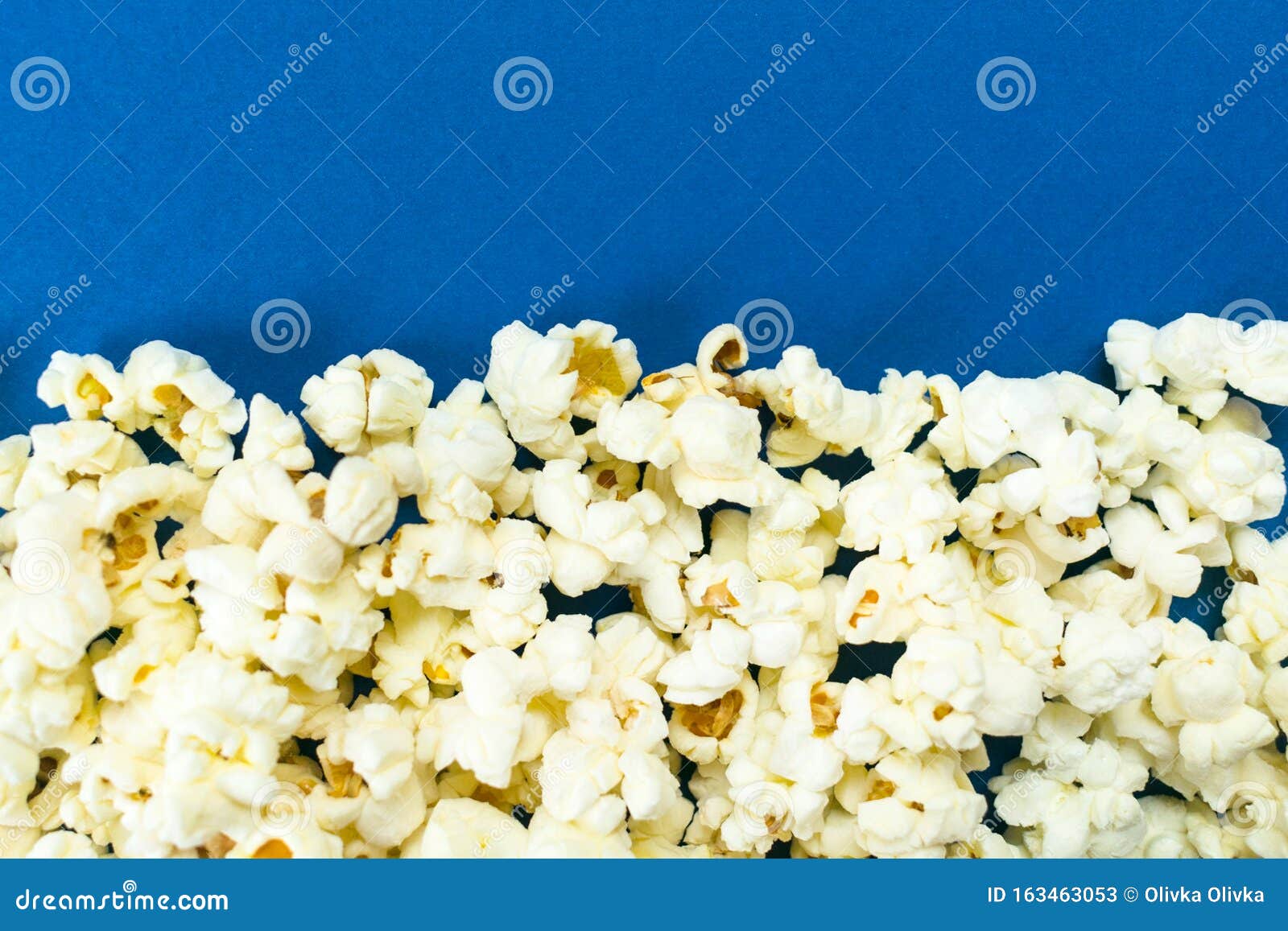 Popcorn on a Blue Background. Copy Space. Stock Image - Image of trend ...