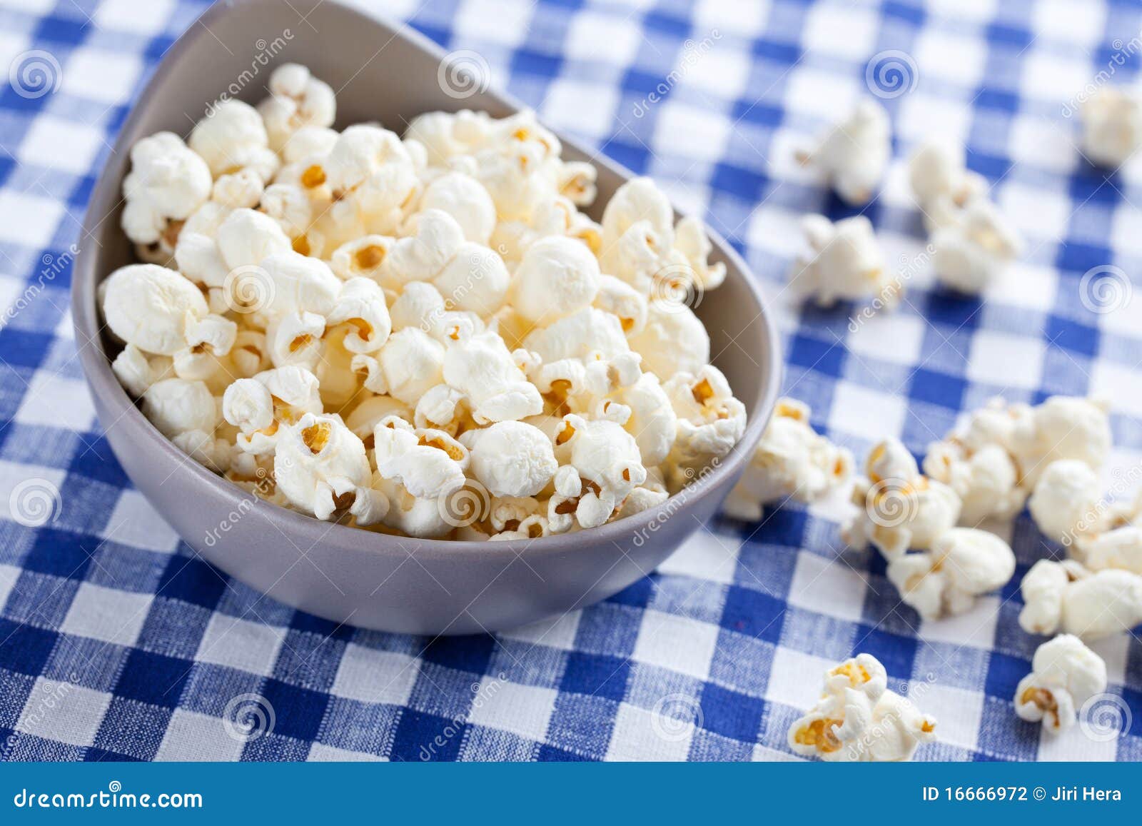 Popcorn in bowl stock photo. Image of butter, buttered - 16666972