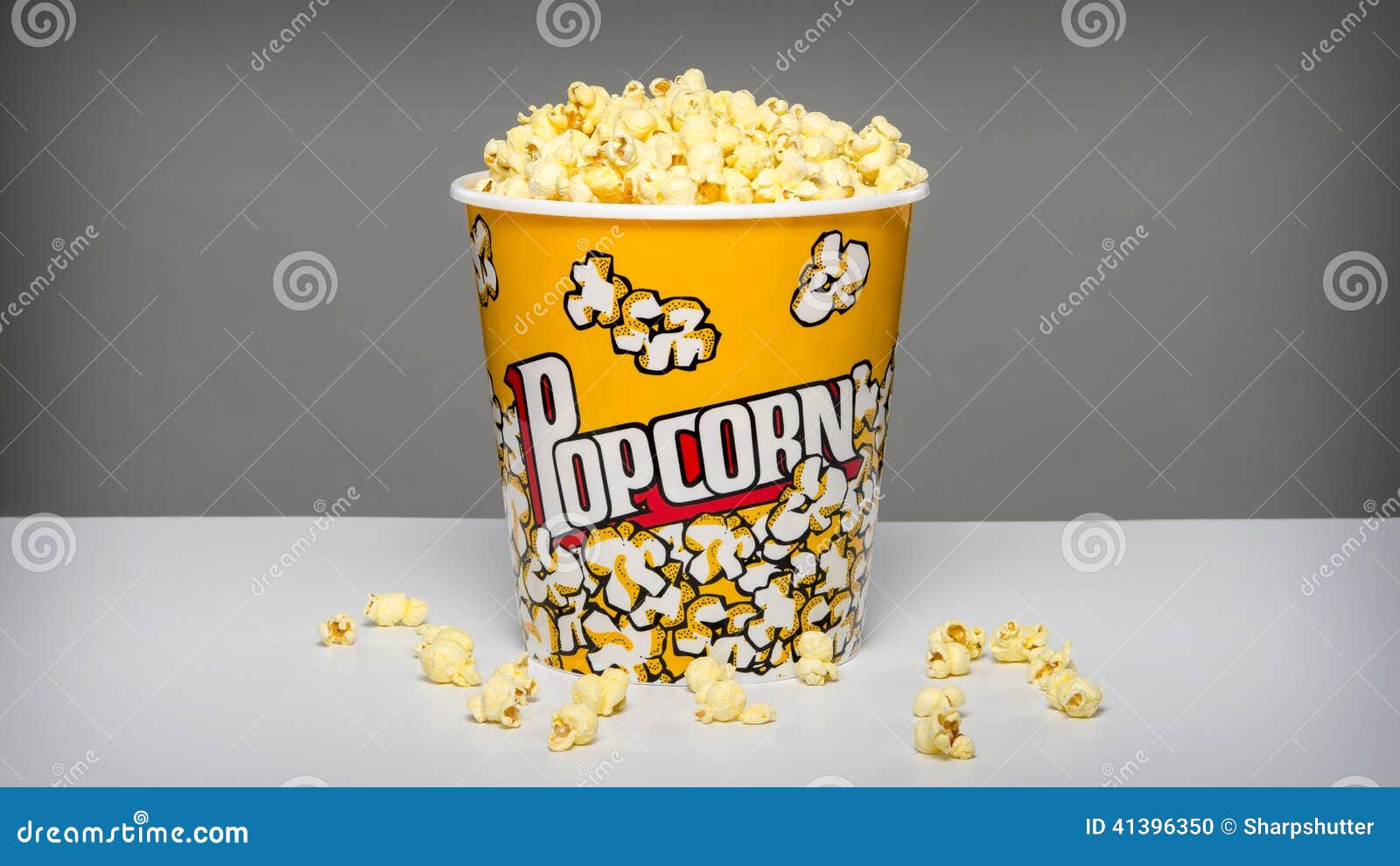 Popcorn Bucket with Kernels Stock Photo - Image of netflix, kernel ...