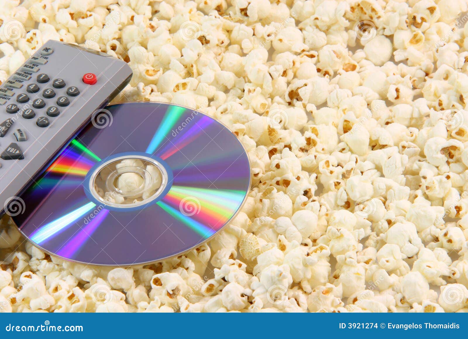 Popcorn Dvd Disc and Remote Stock Photo - Image of corn, movie: 3921274