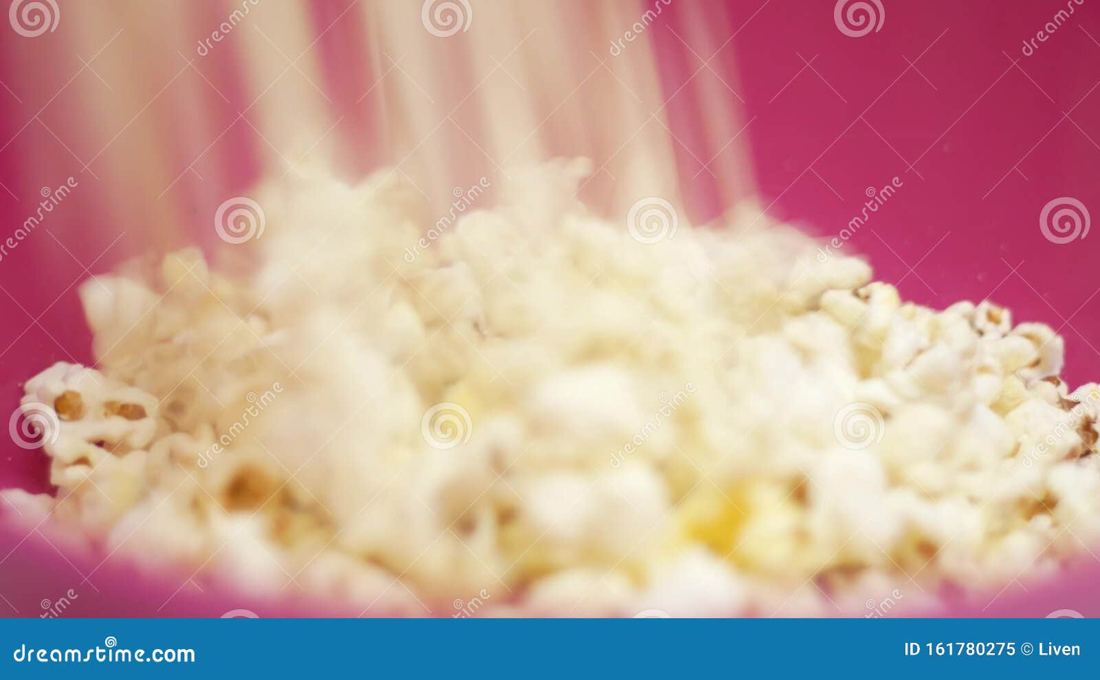 Popcorn falling in a plate stock video. Video of falling - 161780275