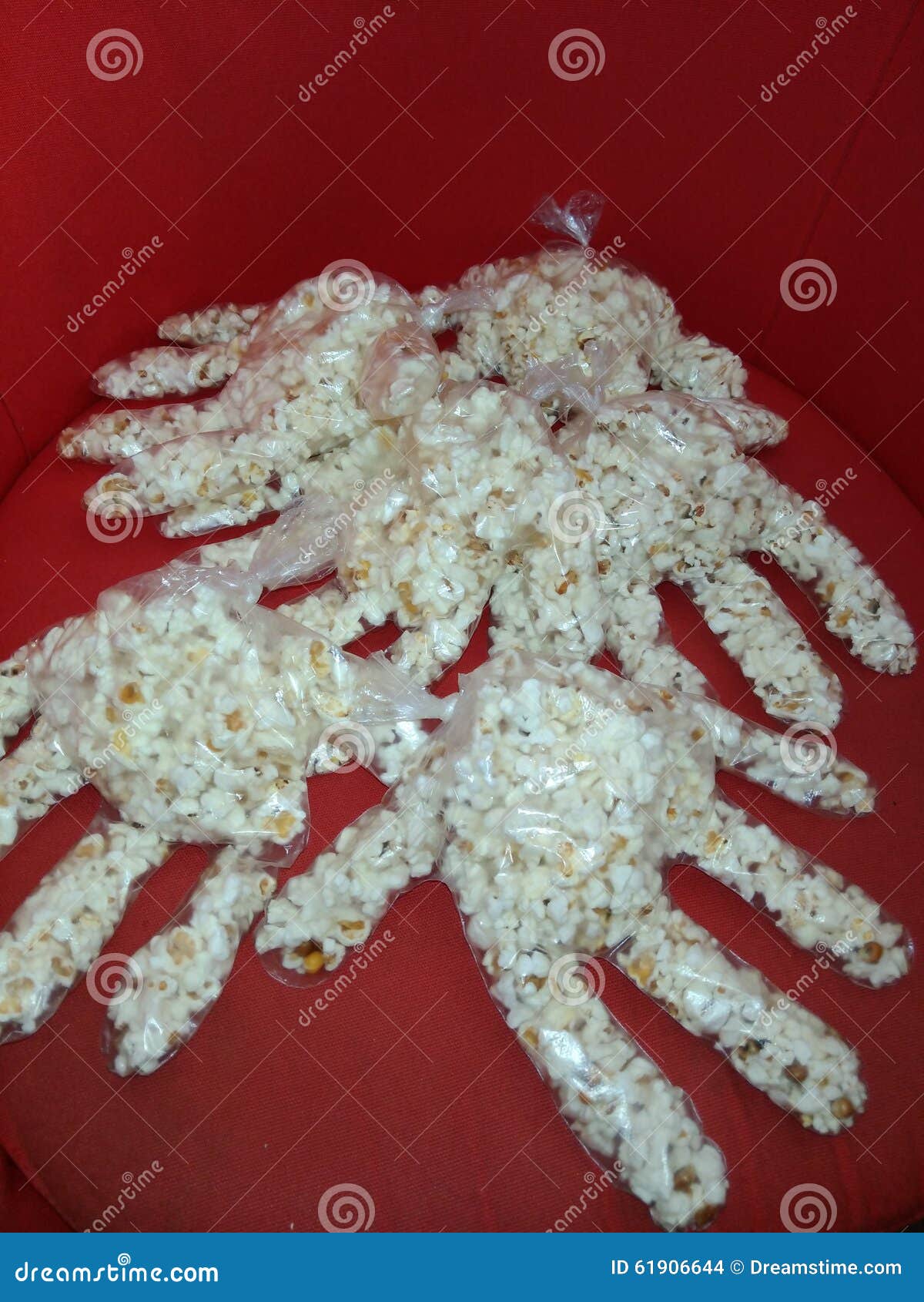 Popcorn hands stock photo. Image of halloween, plastic - 61906644