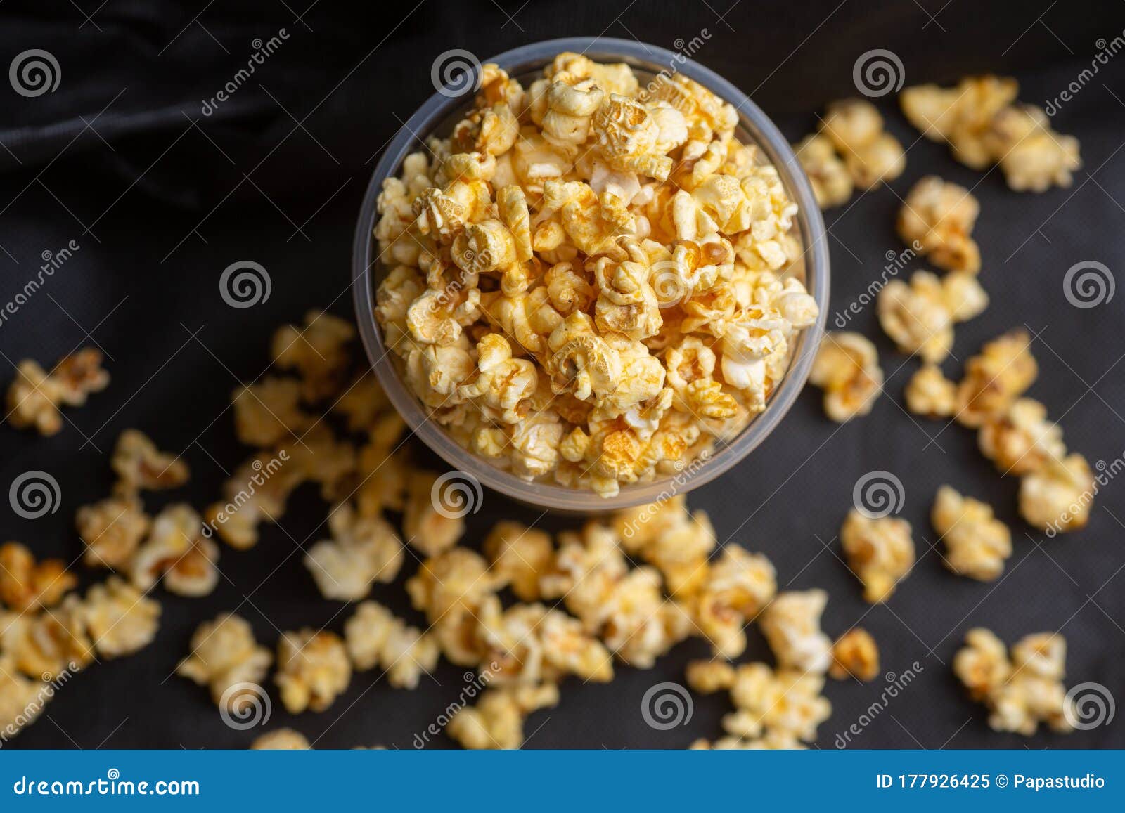 Popcorn in a large bucket stock image. Image of large - 177926425