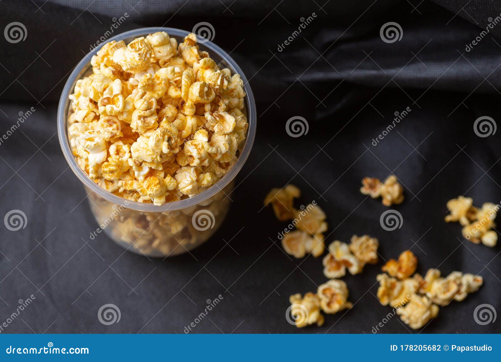 Popcorn in a large bucket stock photo. Image of background - 178205682