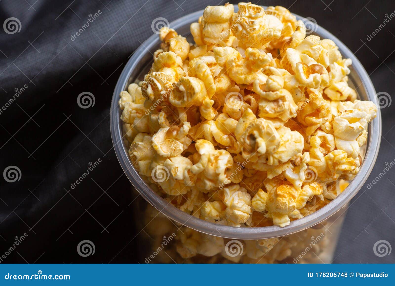 Popcorn in a large bucket stock photo. Image of refreshment - 178206748