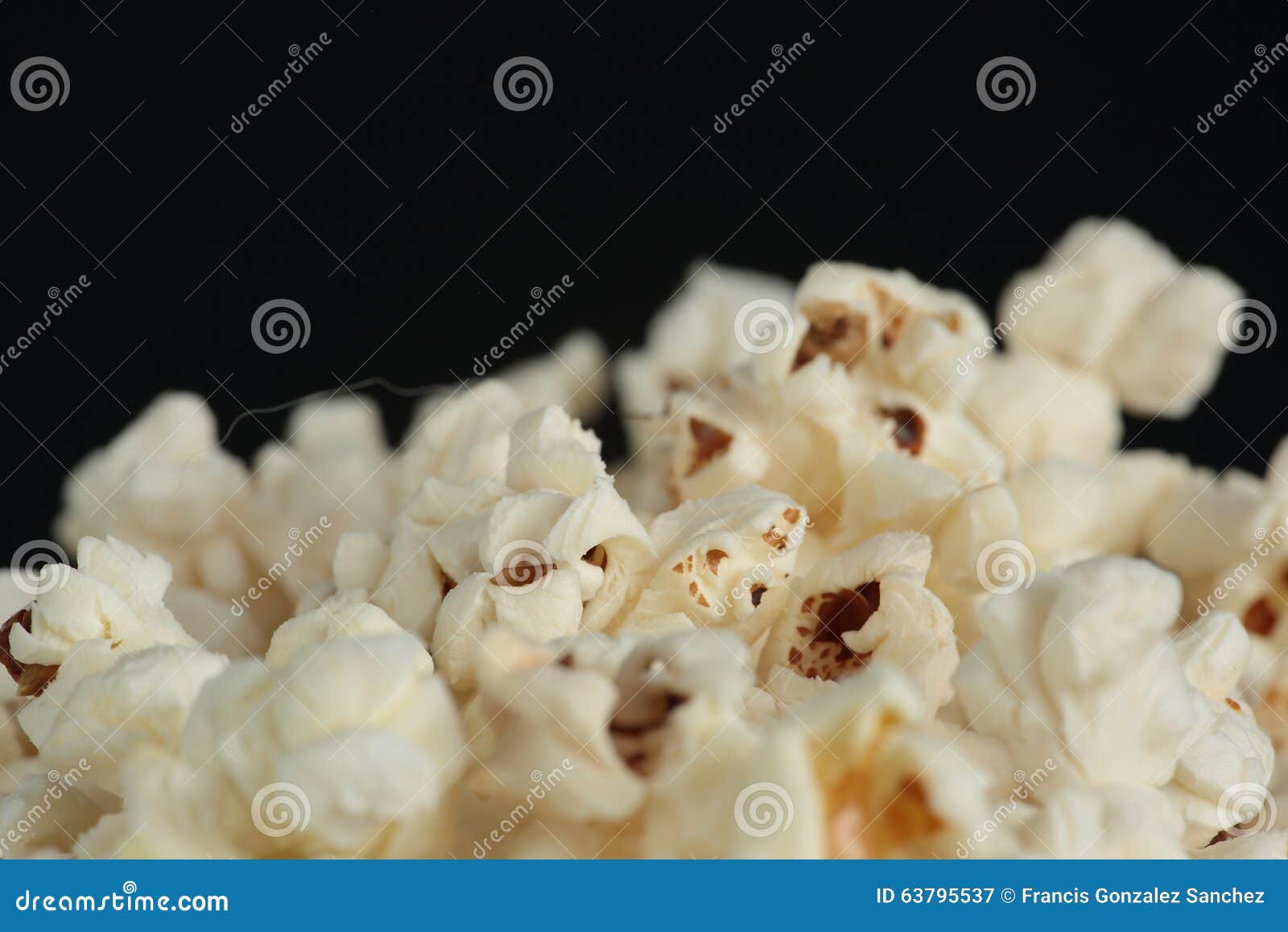 Popcorn in a lot stock image. Image of popcorn, glass - 63795537